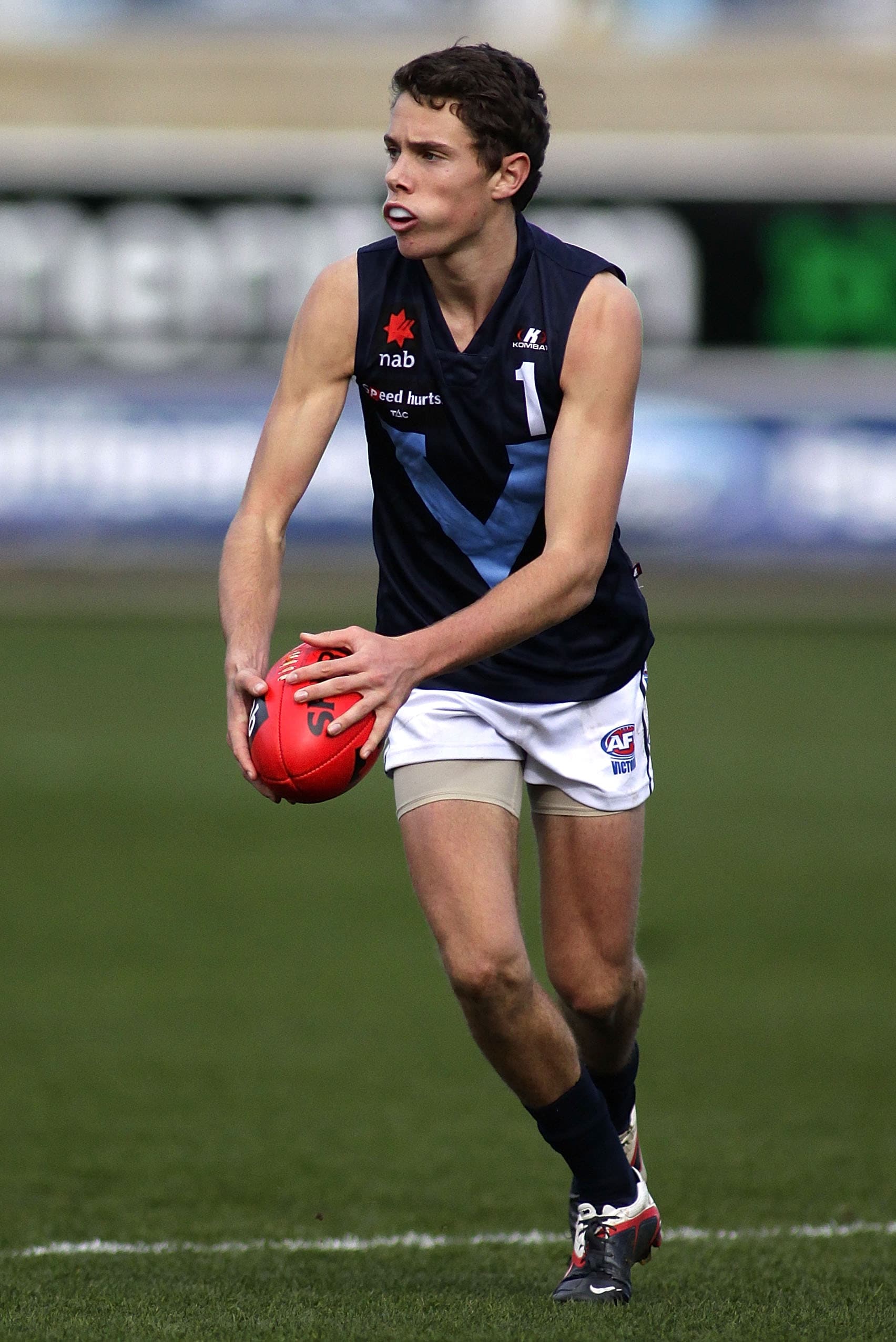 Kelly running towards top draft billing