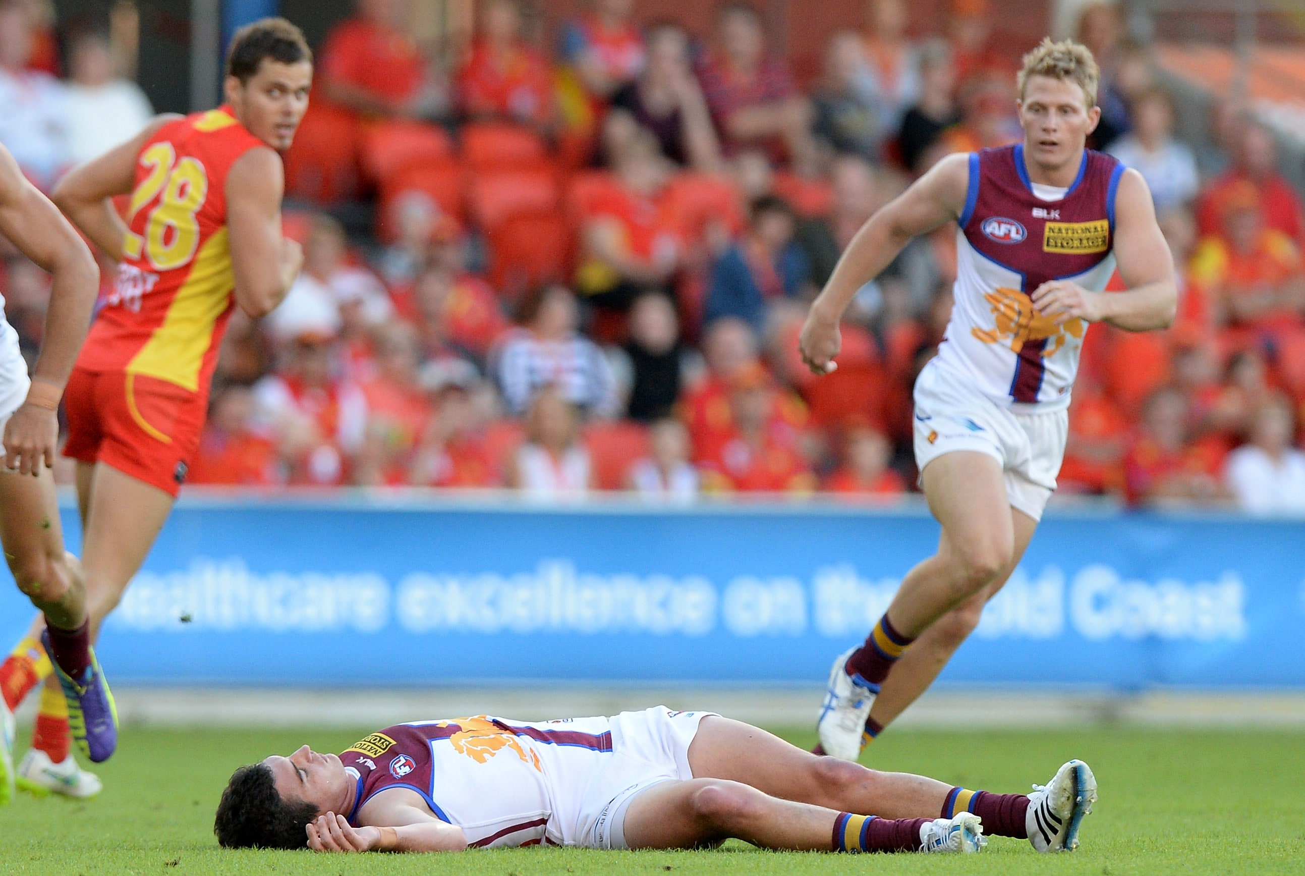 Rockliff off on stretcher after sickening clash