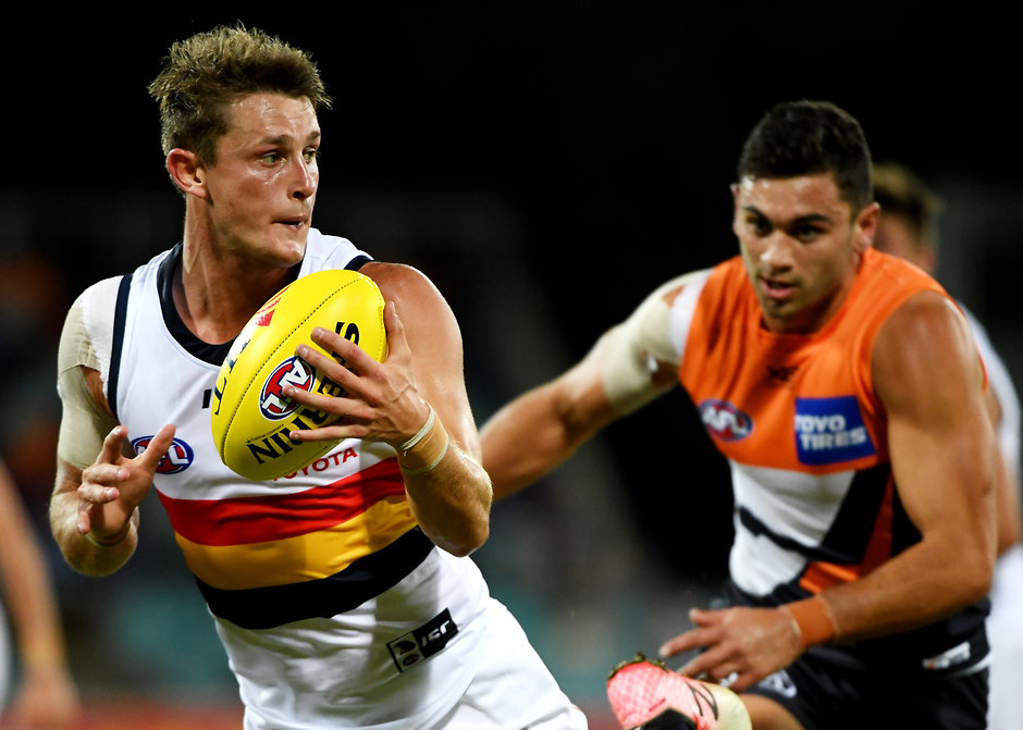 Crouch brothers run riot as Crows cruise against Giants