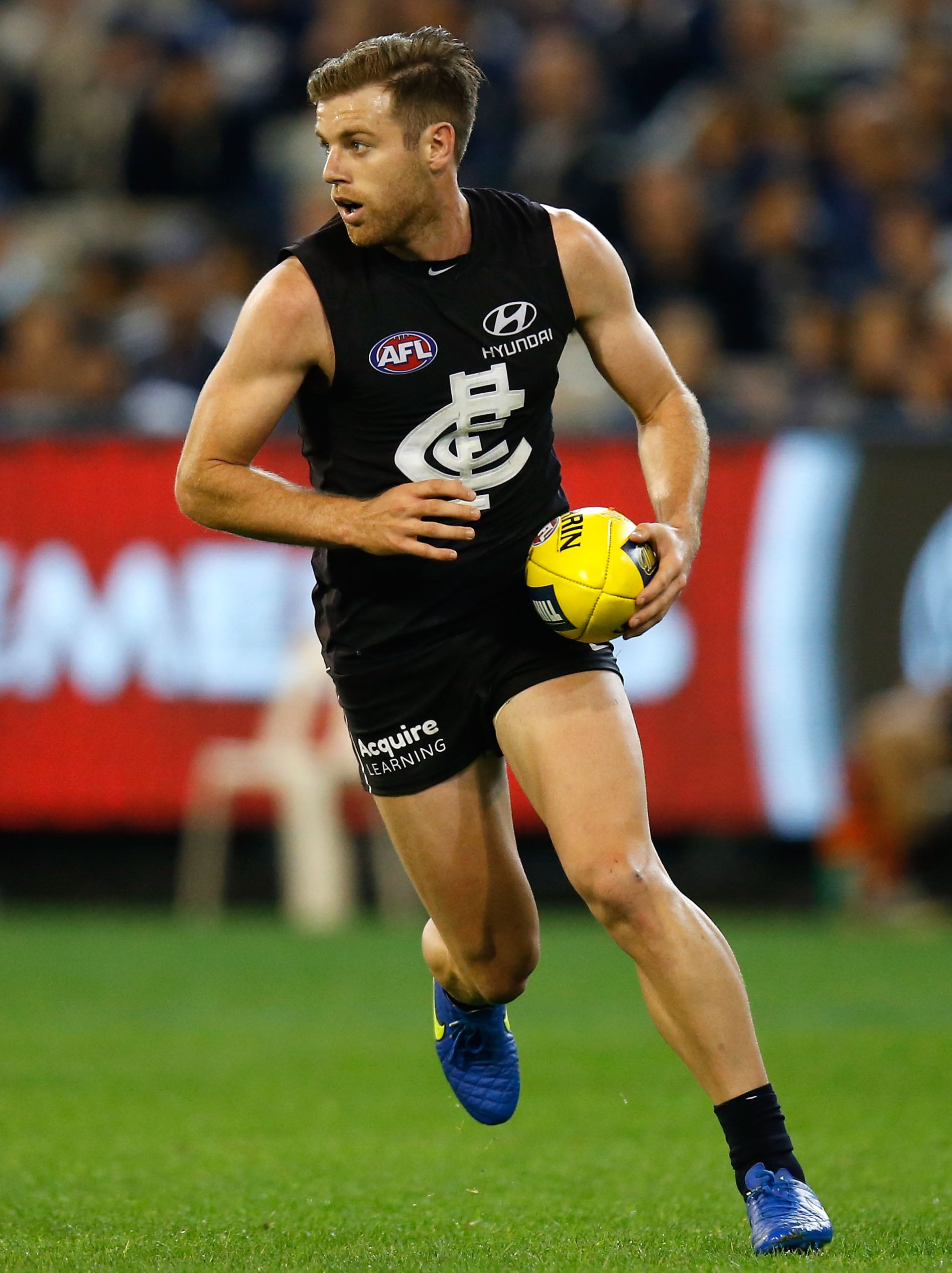 Carlton defender re-signs for three years
