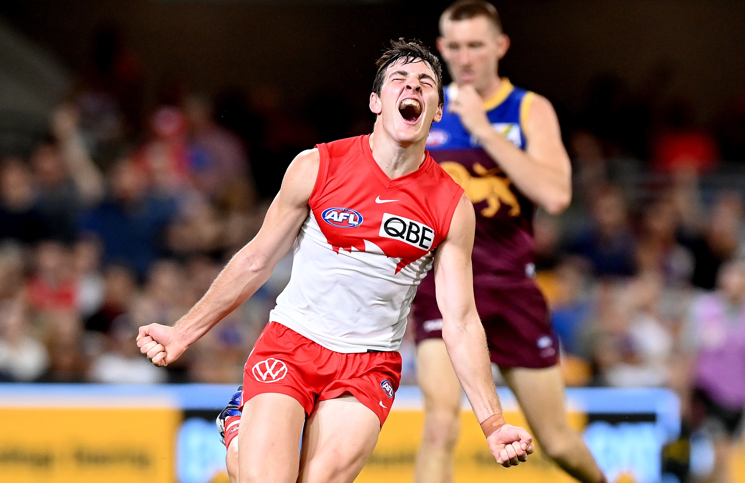 First-game Swans sizzle in Brisbane boilover