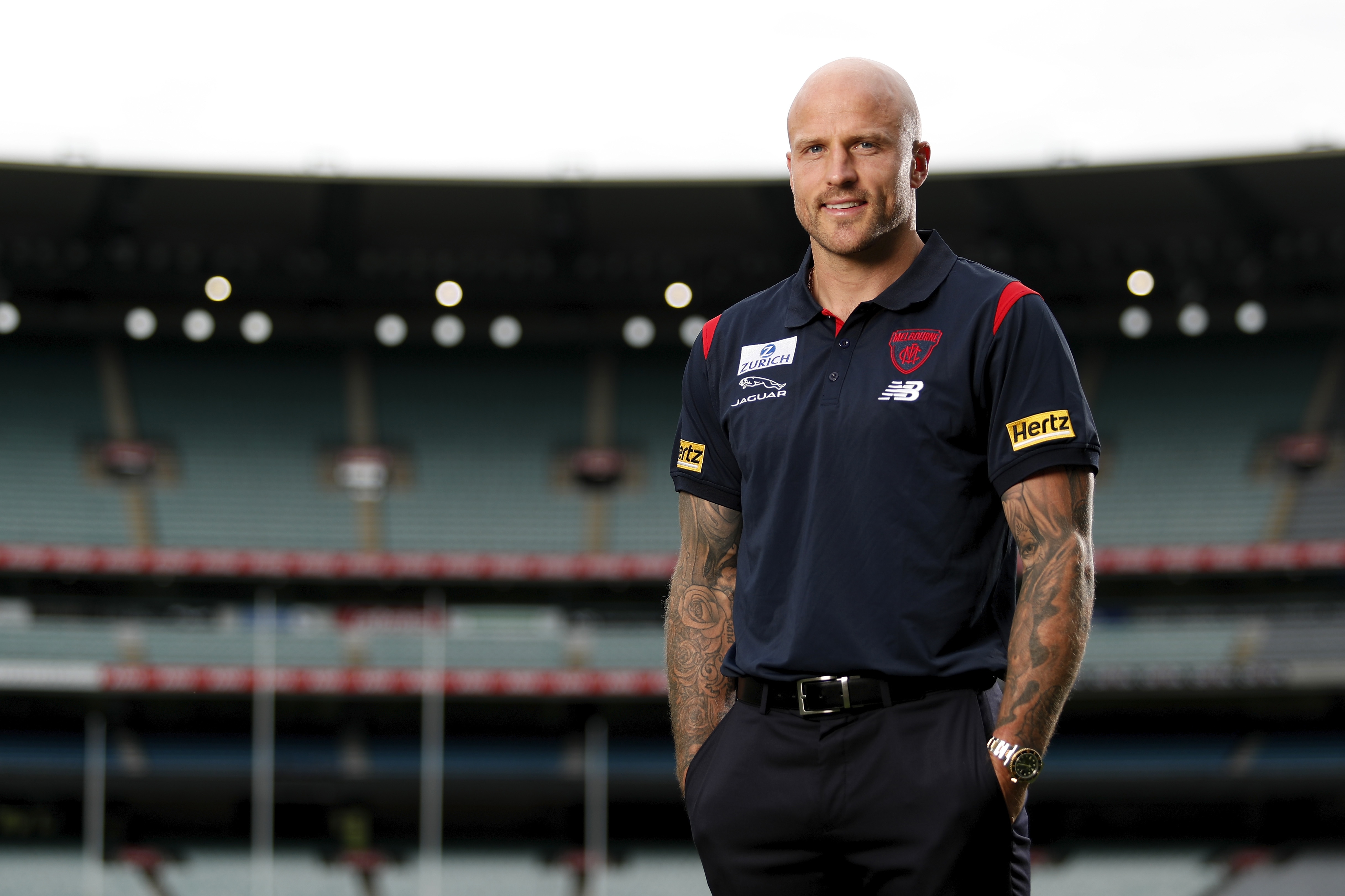 Demons shuffle coaches after review, club great to lead midfield