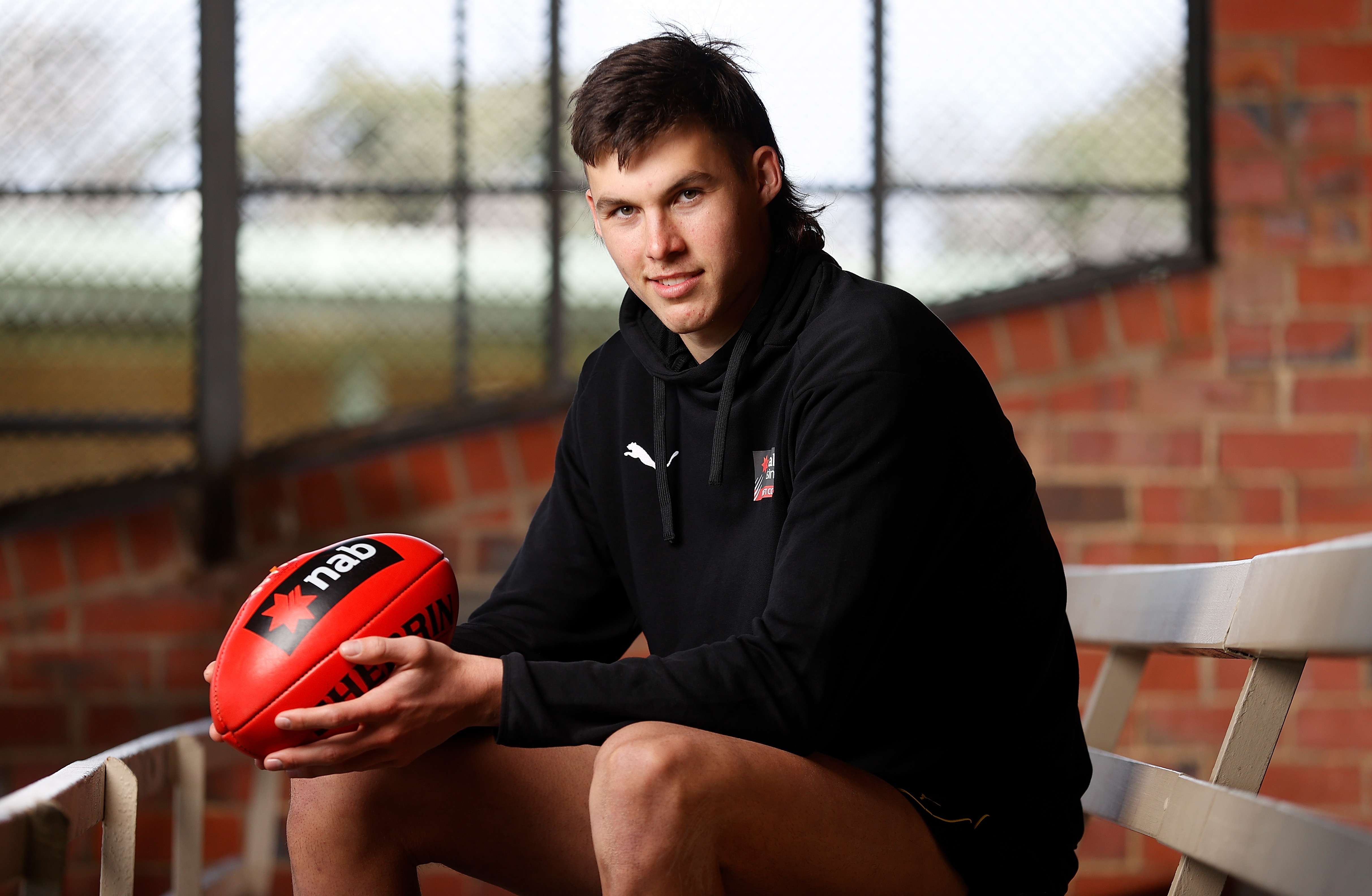 Still growing: Father-son prospect set to be one of AFL's tallest