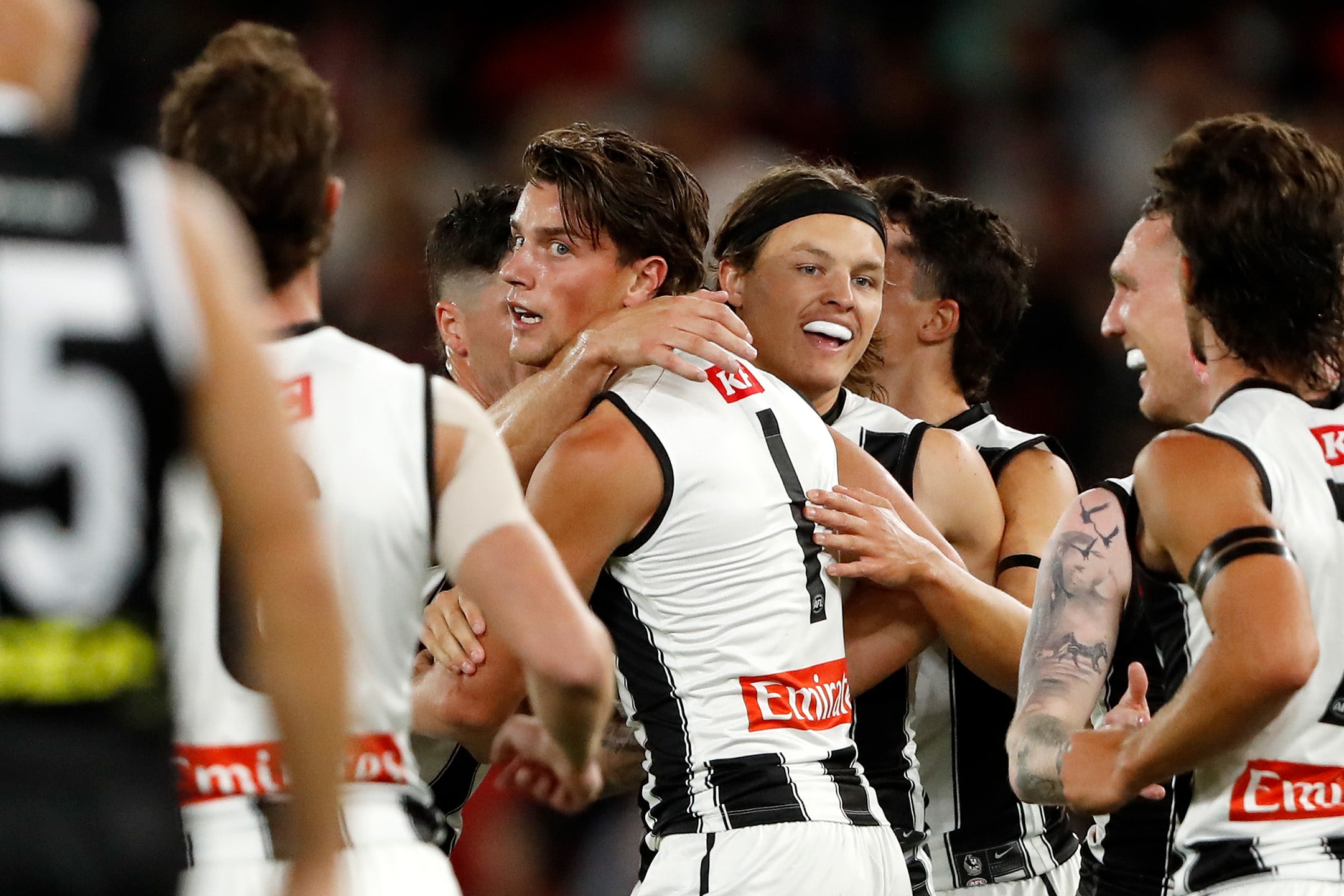 Pies flock as Lipinski nets first in new colours