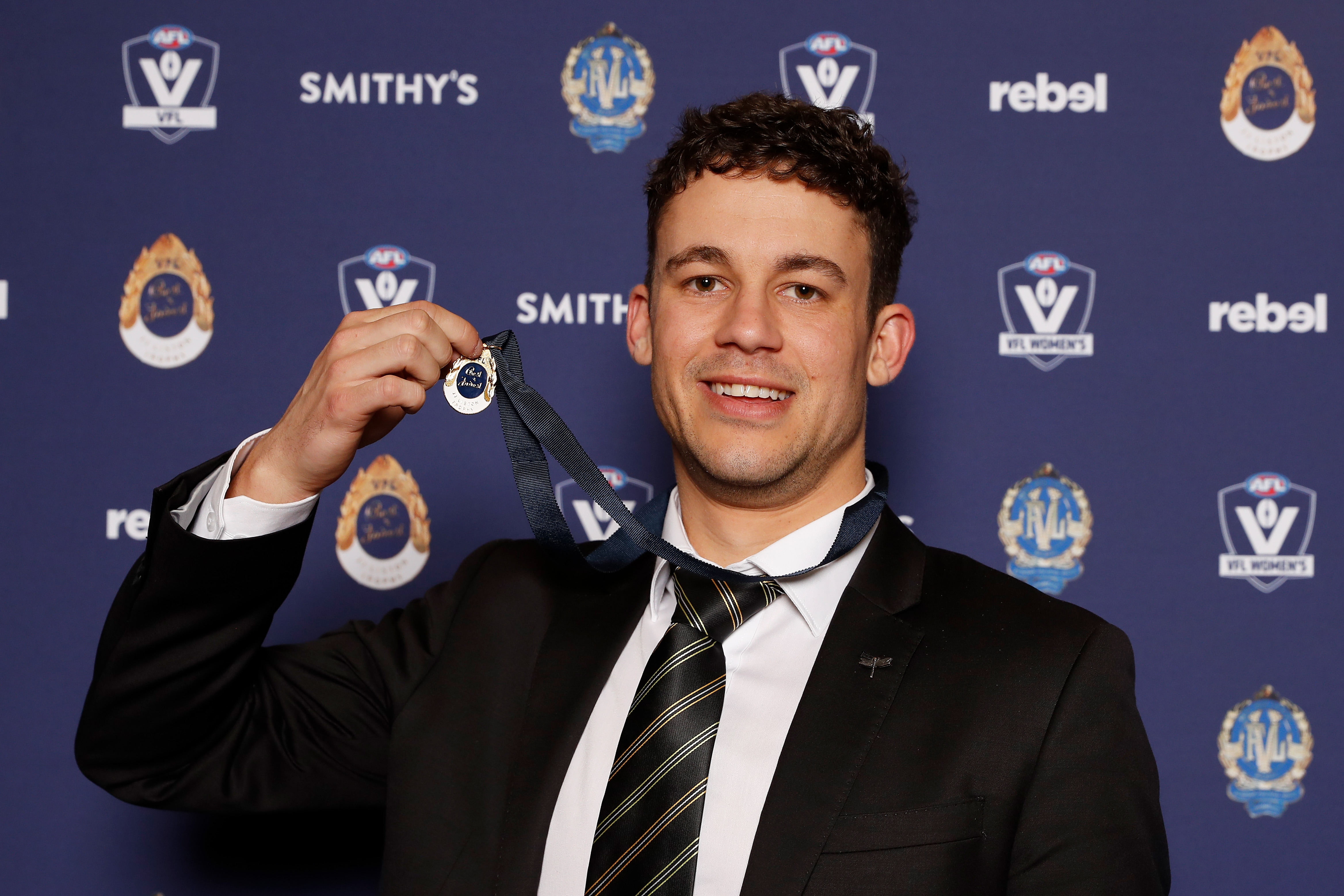 Back to back, three years apart: Gribble wins second J.J. Liston Trophy