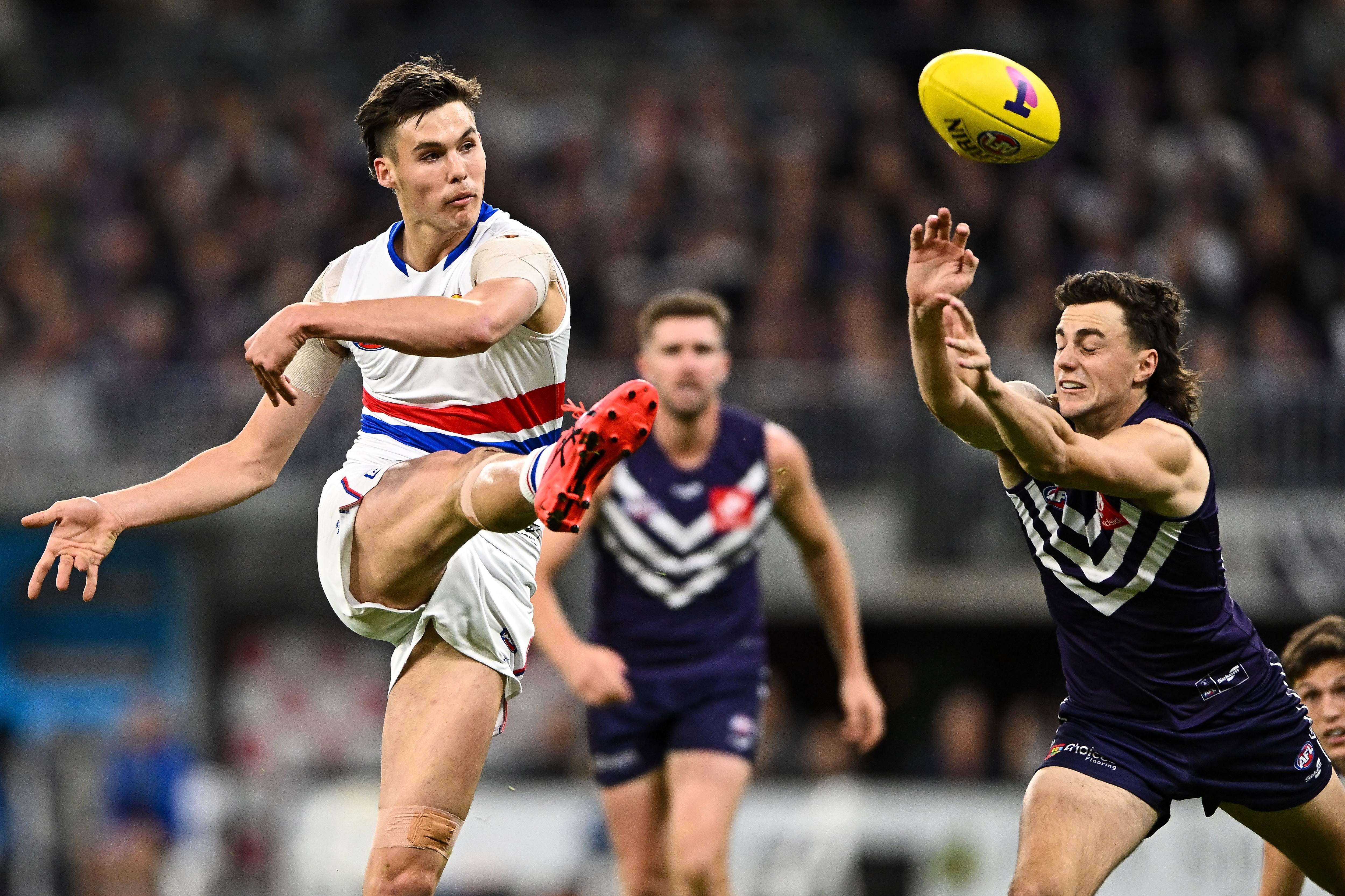 Father figure: How Luke Darcy is handling Sam's AFL journey
