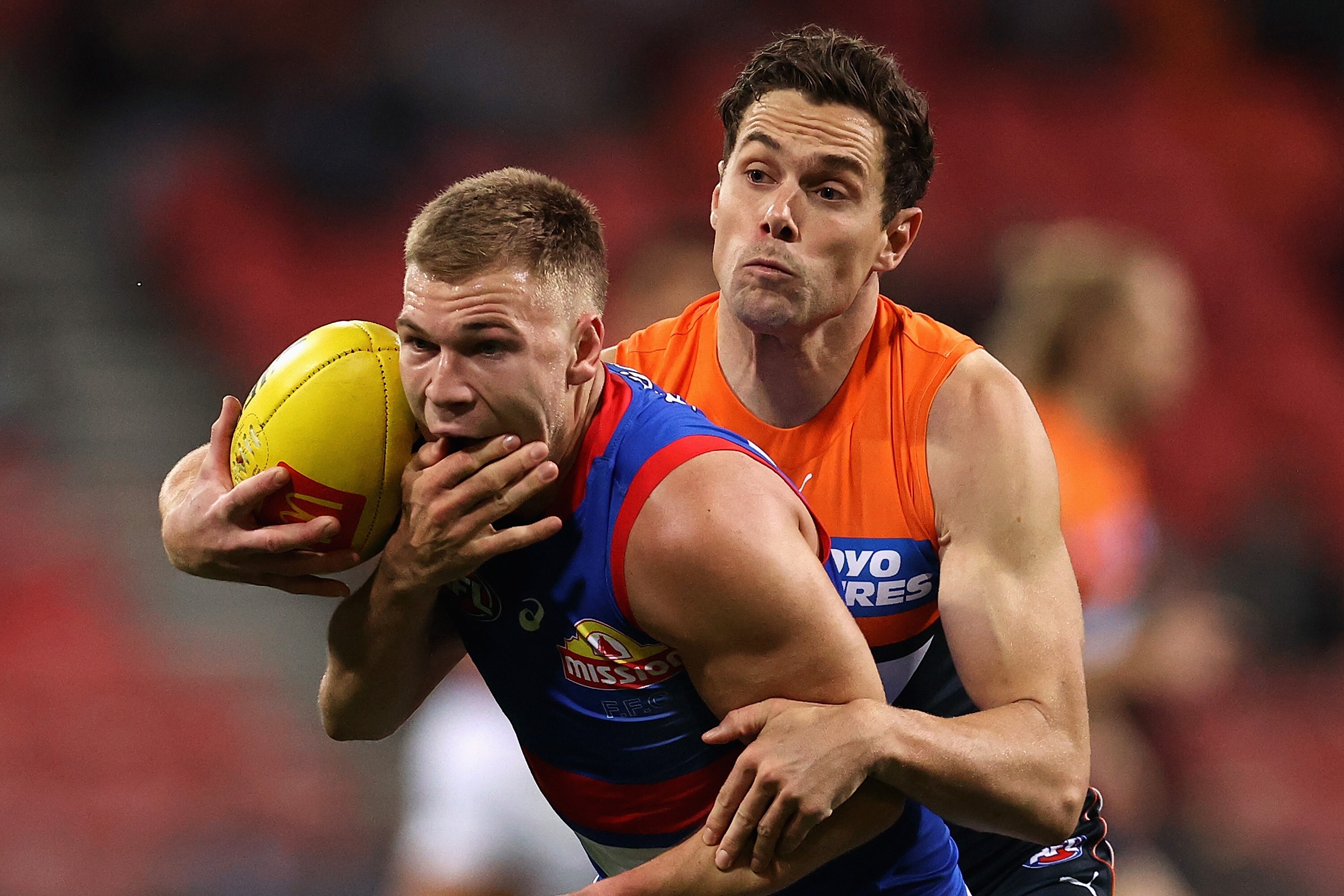 Fierce rivalry to heat up Canberra as Giants aim to put bite on Dogs