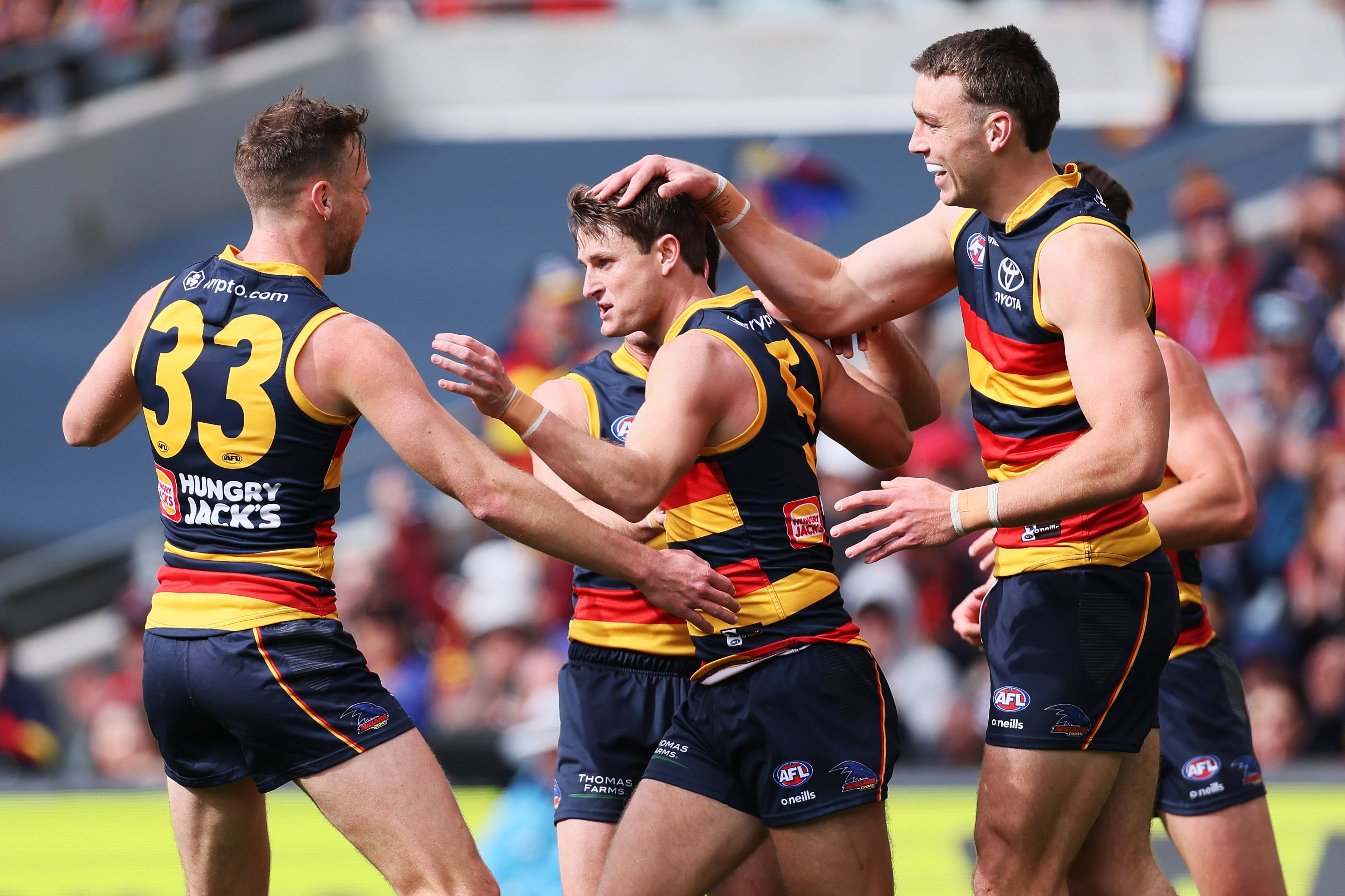 Crows' season lives on after outclassing Suns in feisty clash
