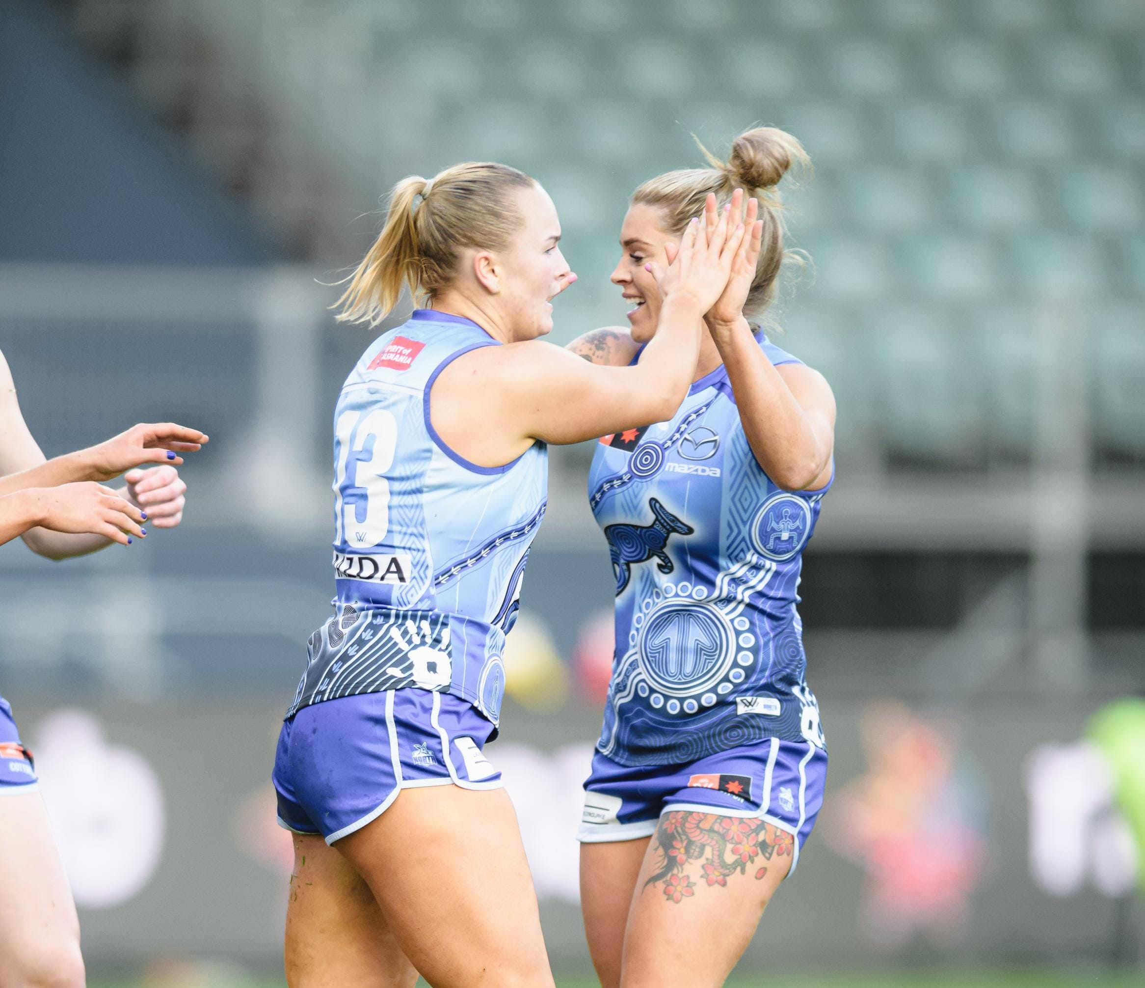 Roos get jump on Cats to claim victory in soggy slog