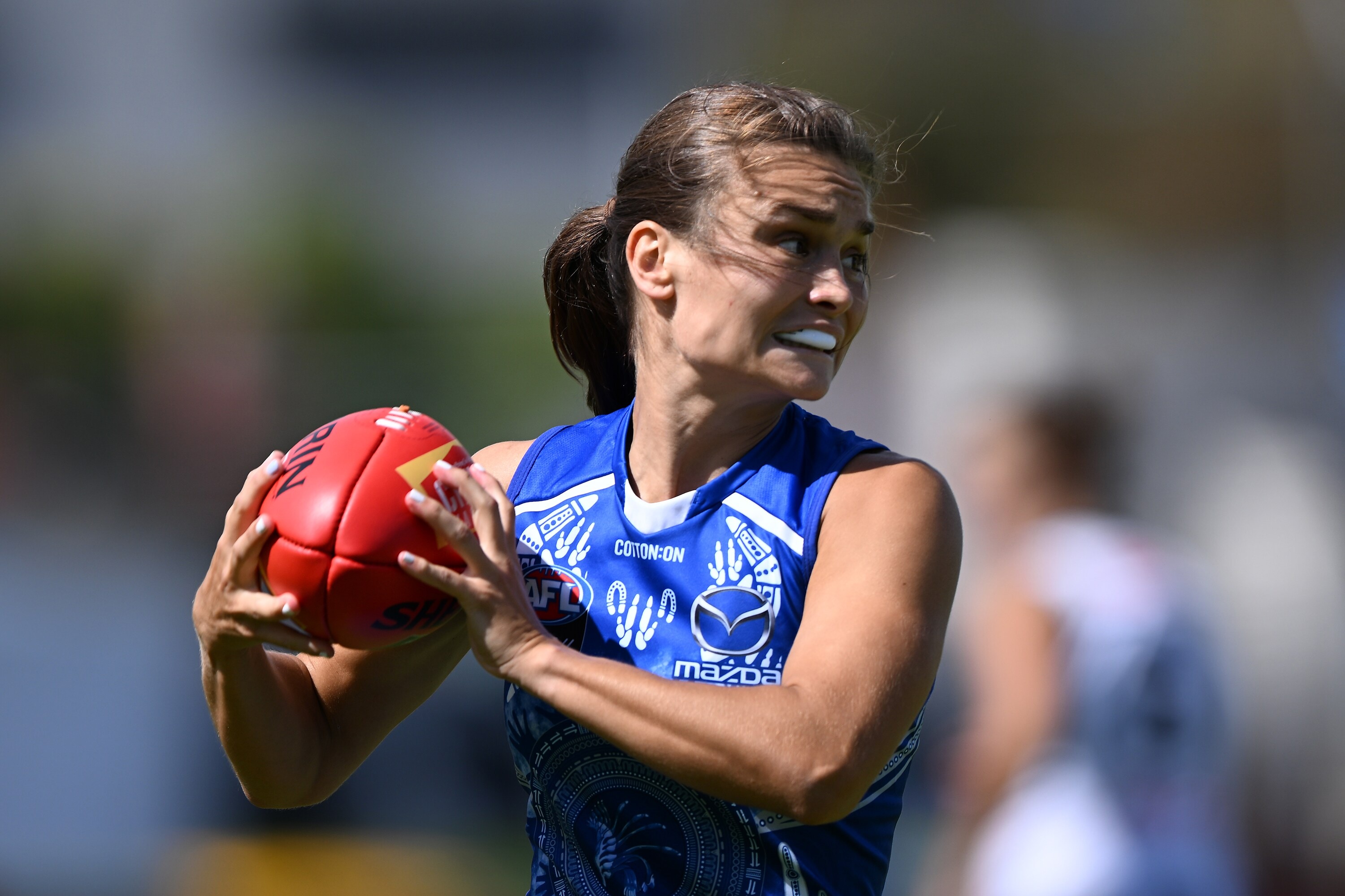 Two more years for gun Kangaroo as Pies, Dees lock in stars