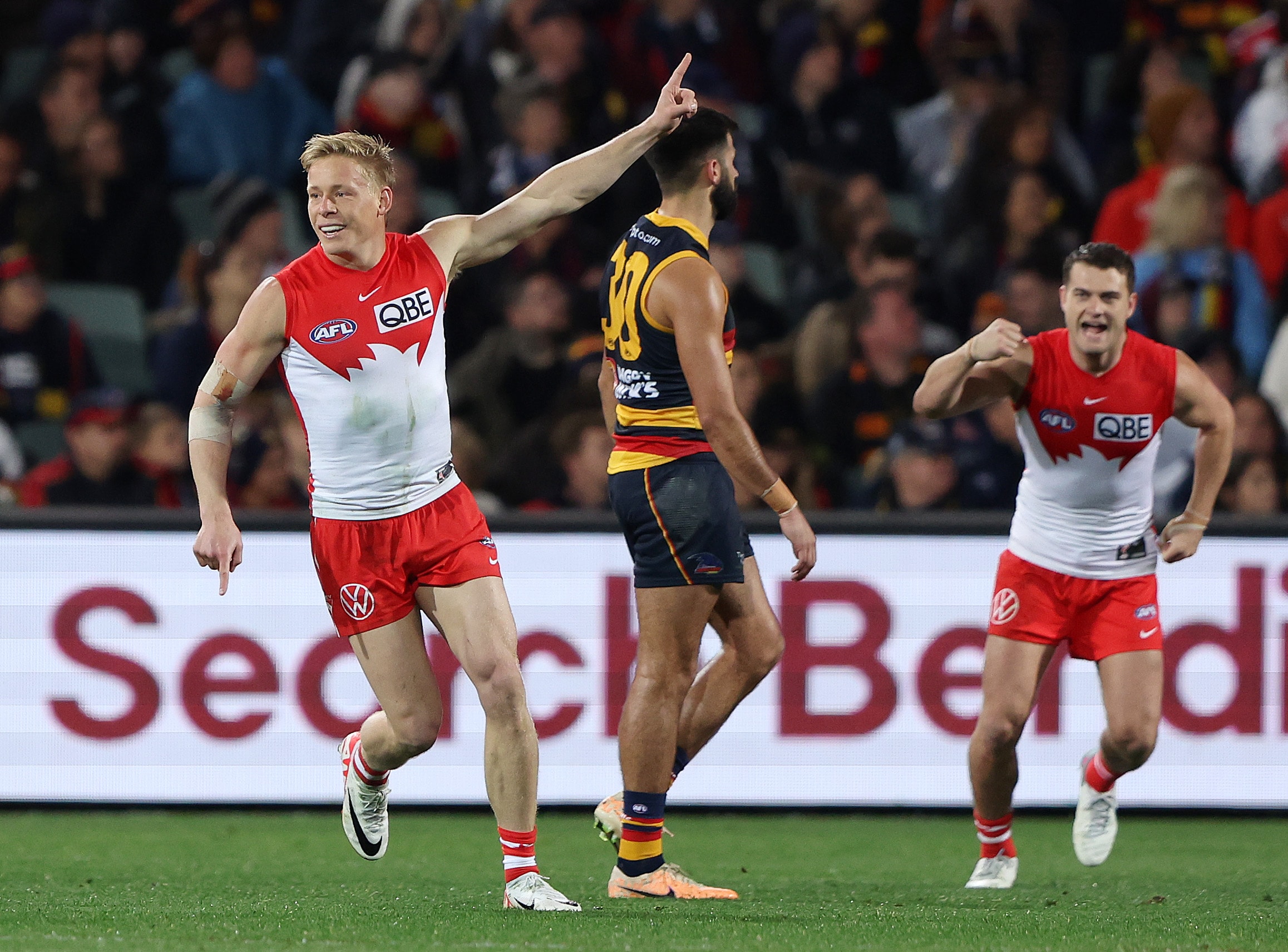 Crows denied! Controversial call sees Swans surge towards finals
