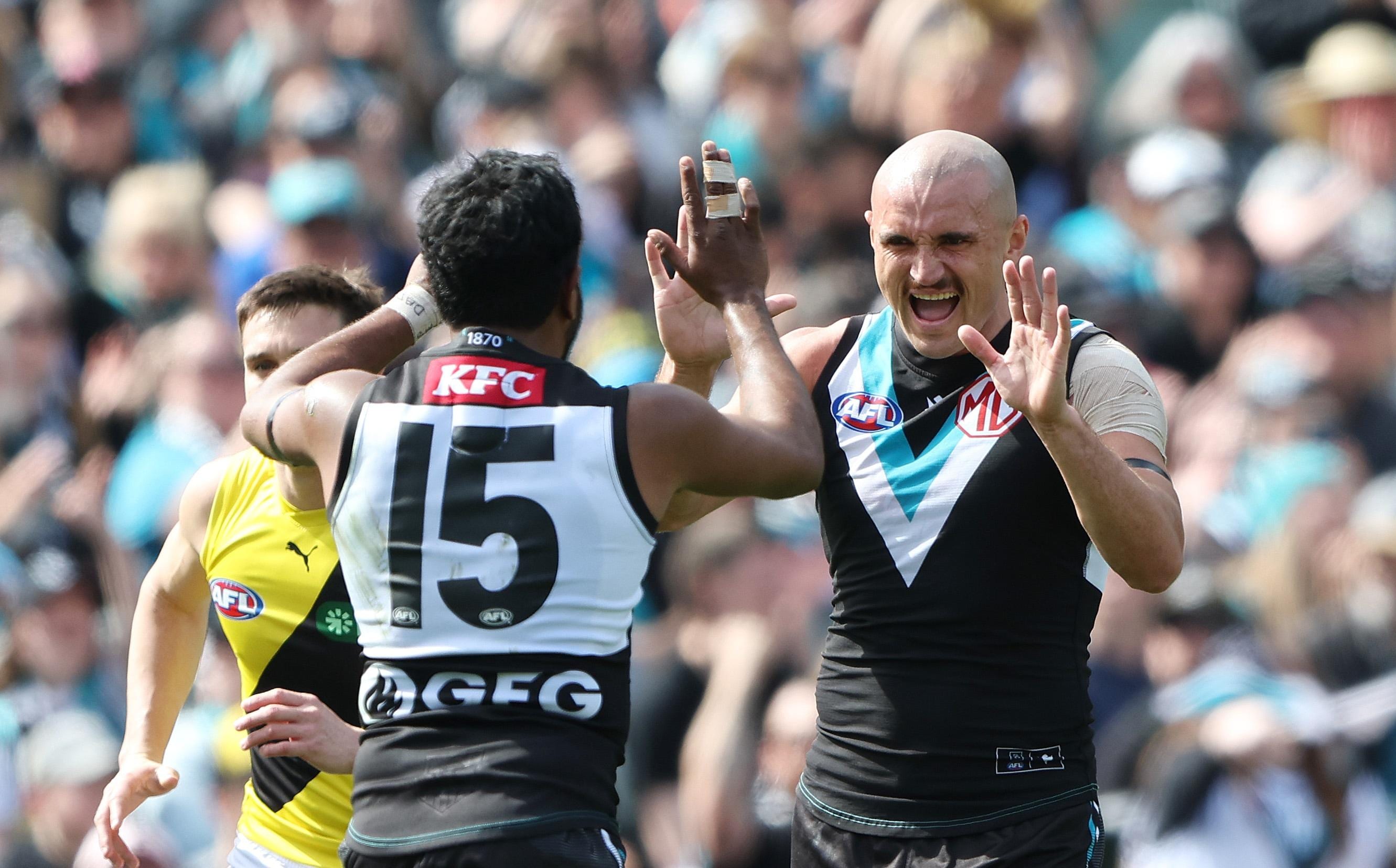 Port locks in third spot with late surge over Tigers