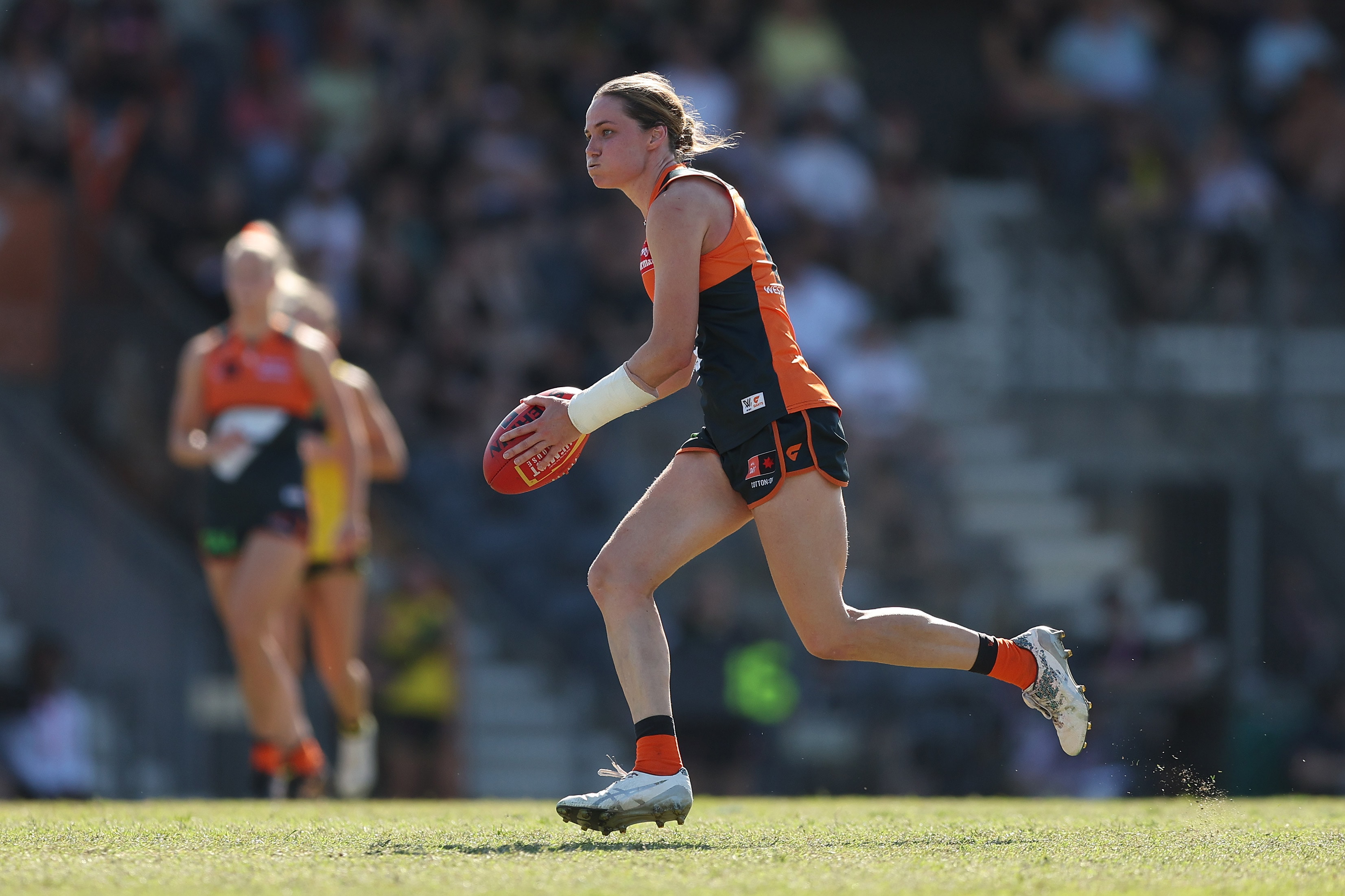 Multi-sport athlete retires from AFLW after career at Giants, Blues