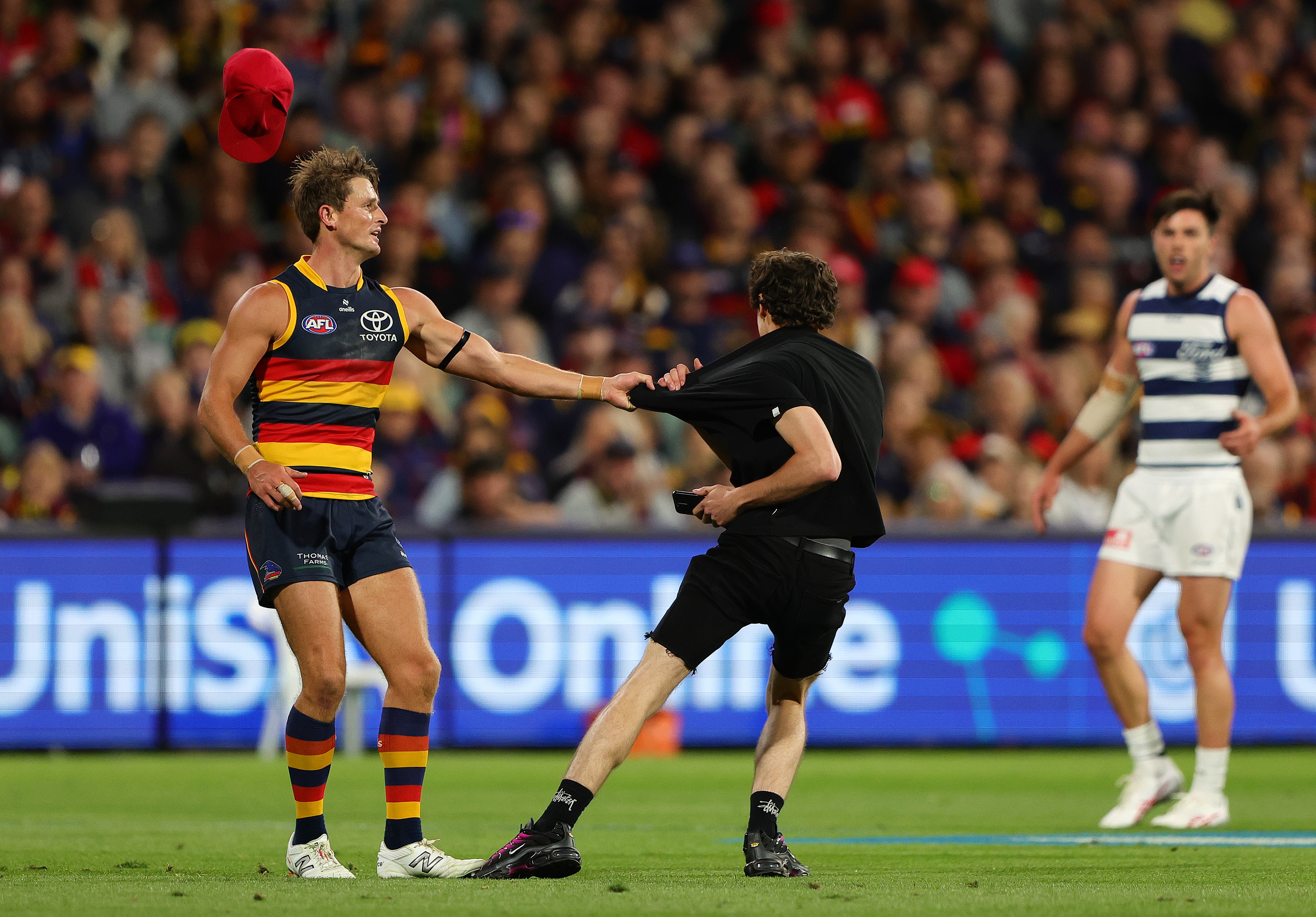 AFL ground invader banned for life for 'senseless' act