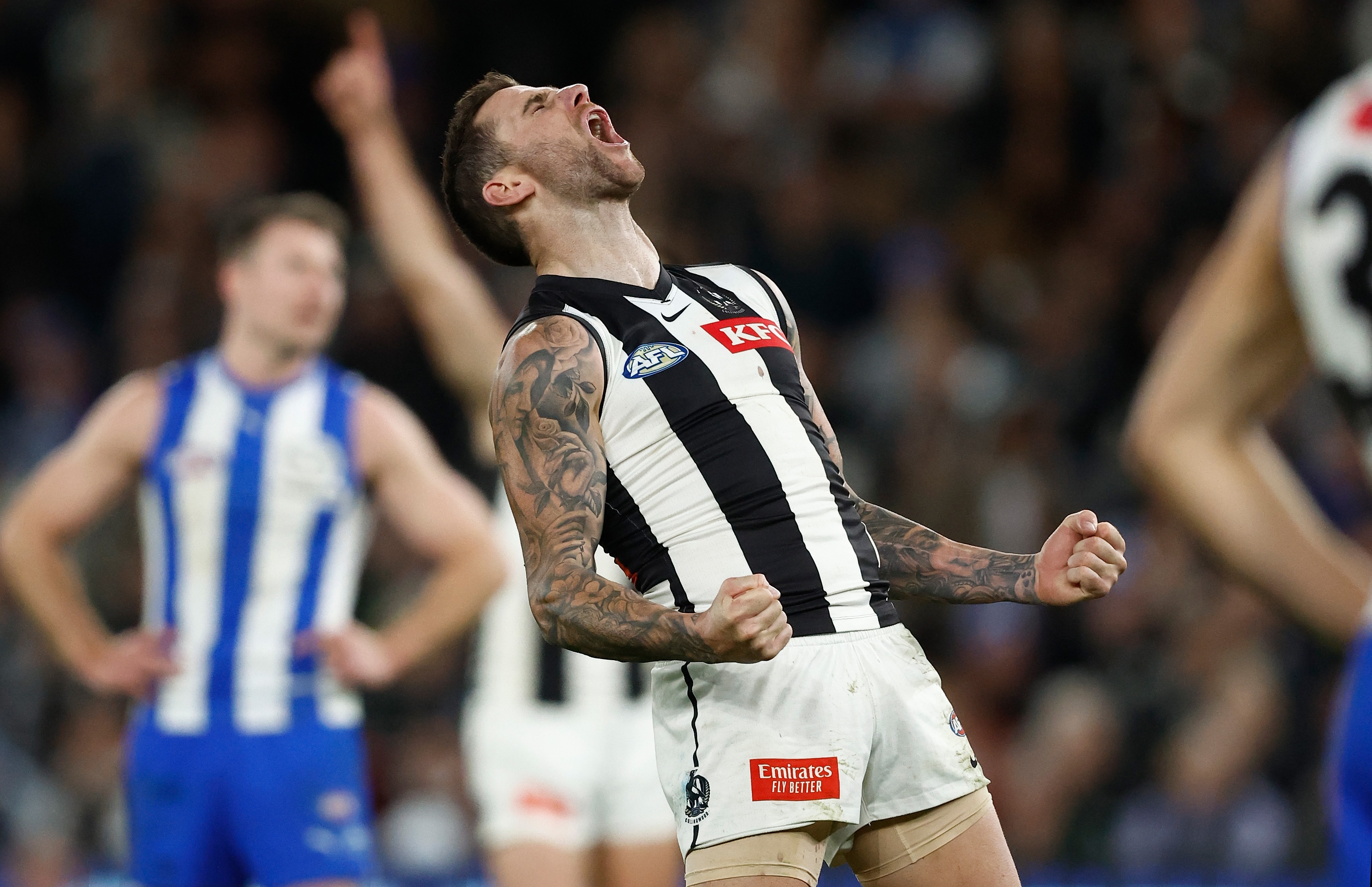 Pies come from 54 points down to break brave Kangaroos' hearts