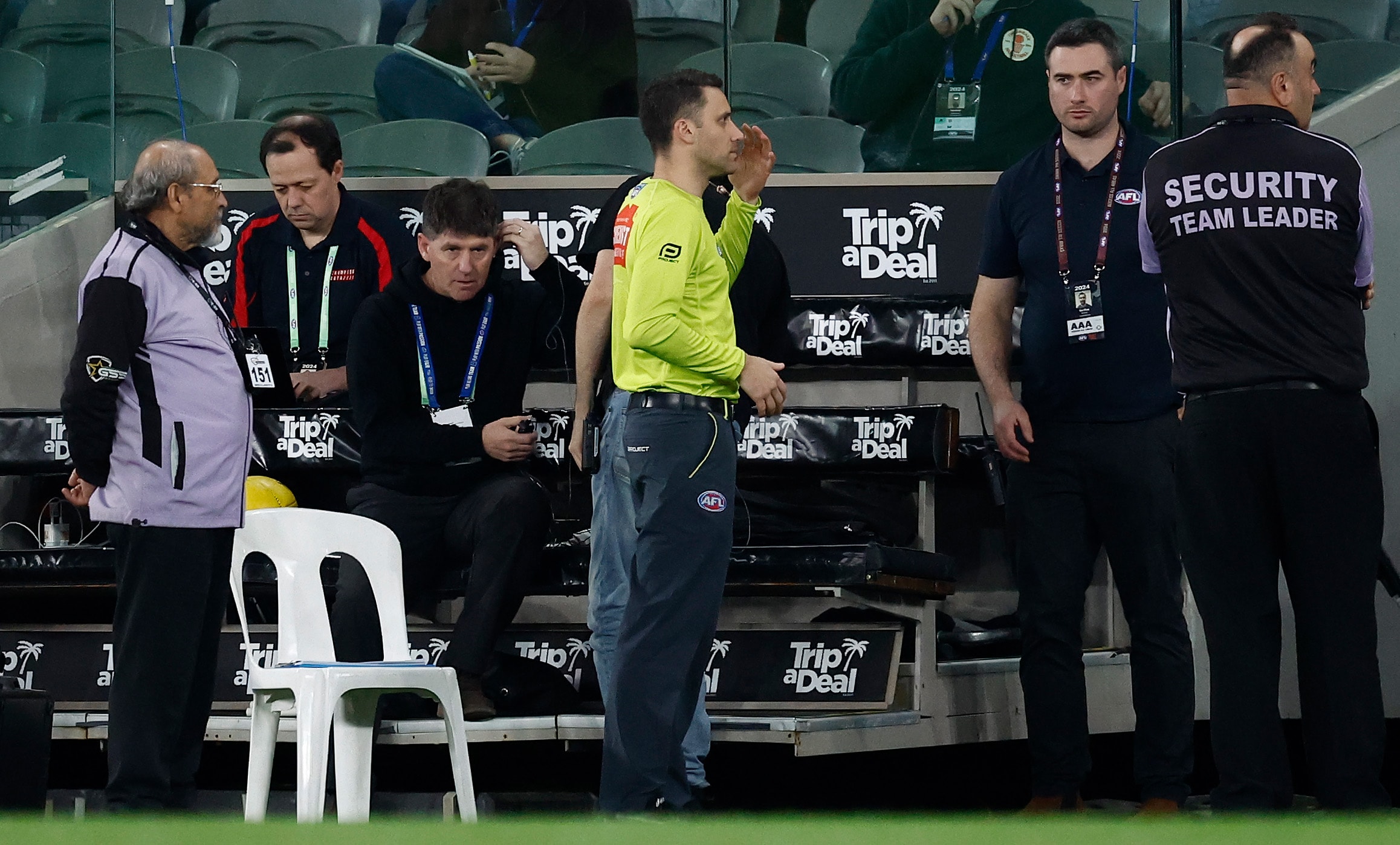 AFL fan banned for life after umpire hit with bottle