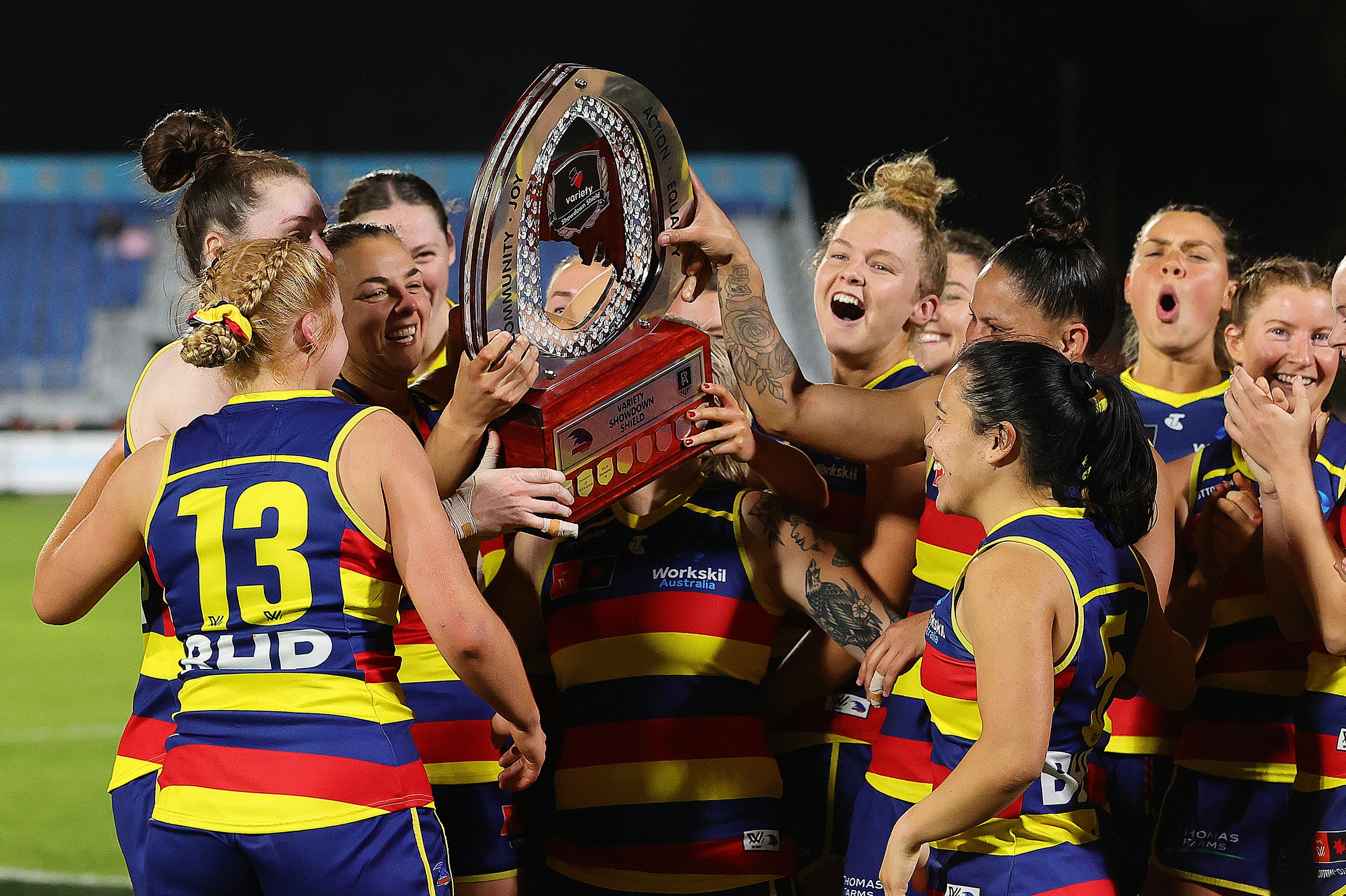 Crows survive scare from gritty Power to clinch Showdown