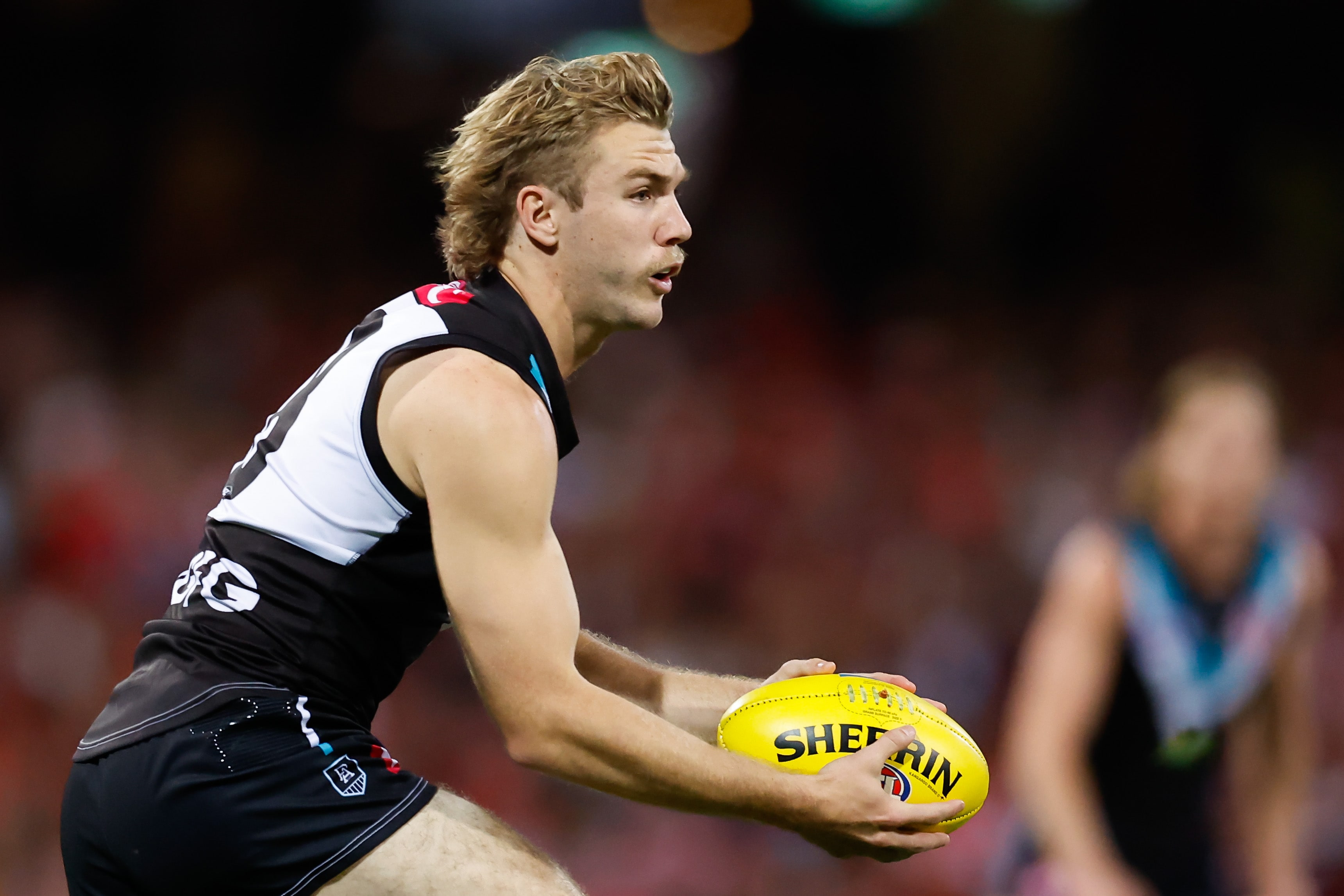 Trip abroad steers young Port gun's quest for greatness