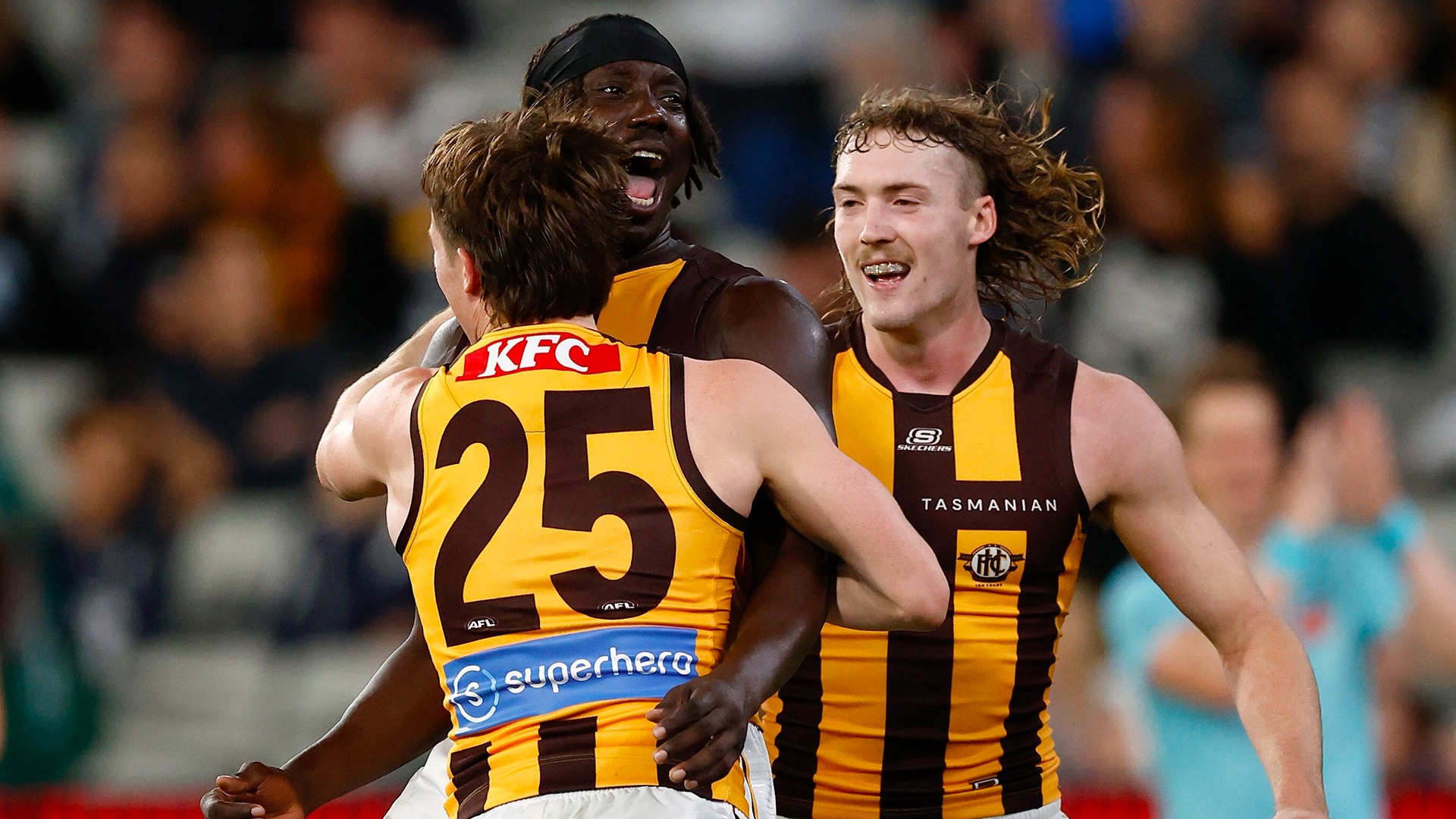 Hawks battle past Blues to soar to 3-0 start