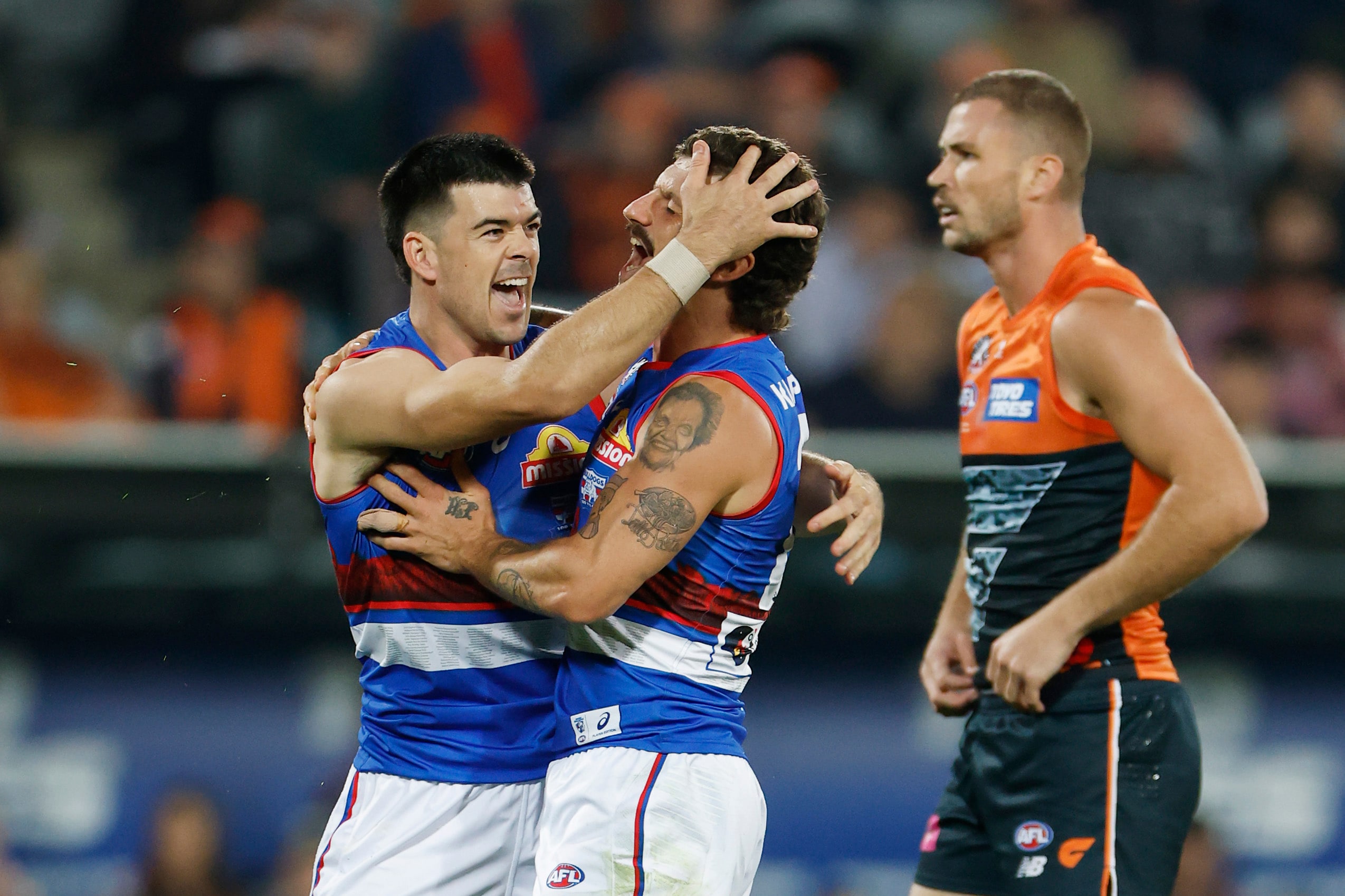 Dogs dominate Giants in second-half blitz