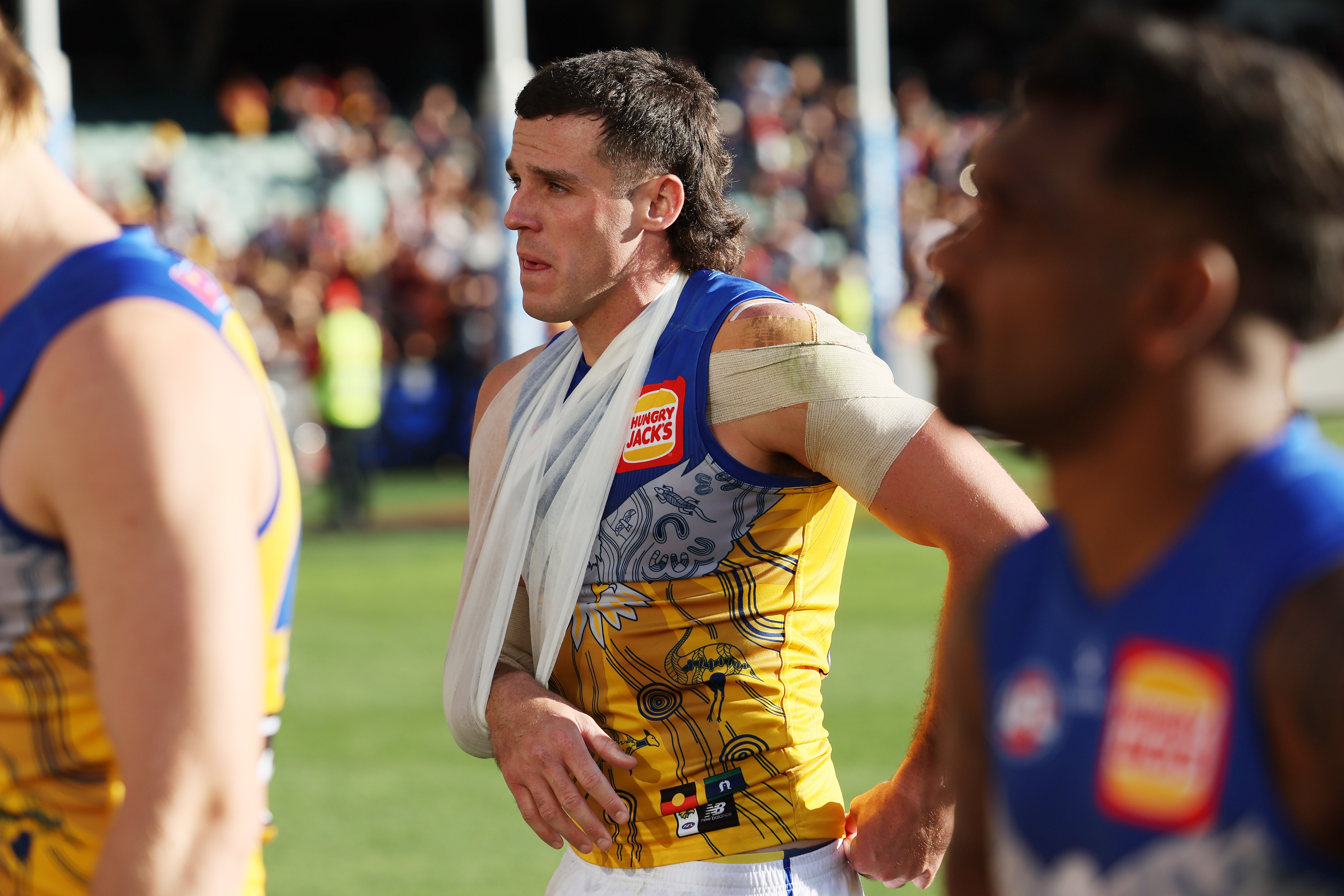 Eagles sweat over forward's shoulder injury, Crows' late call