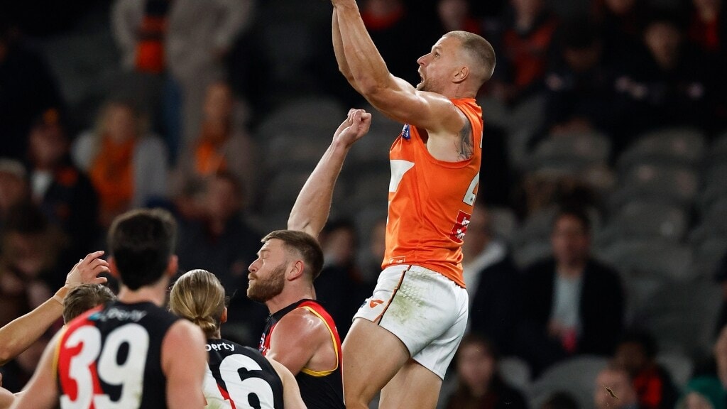 Jumping Jake launches over ex-teammate with cracking hang