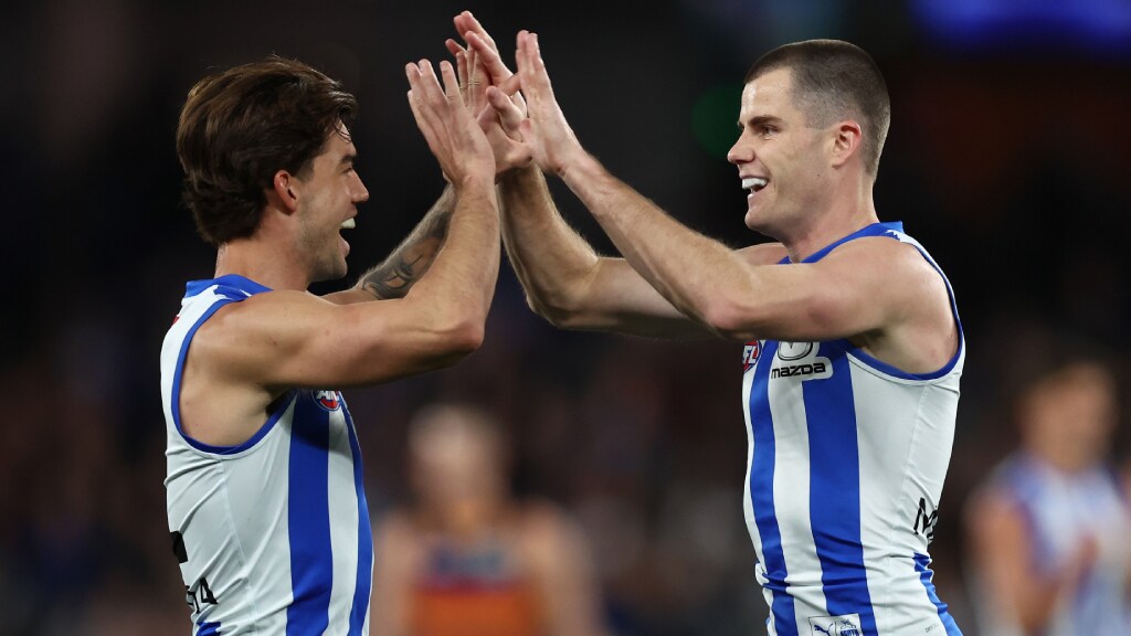 Super Scott strikes it from downtown to get Roos running