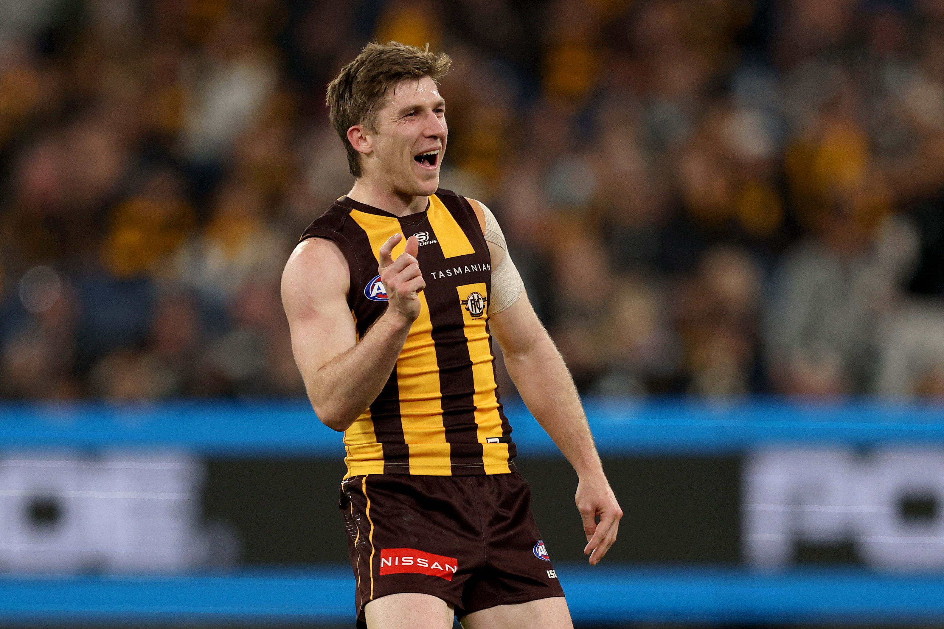 Four Moore years as star Hawk extends contract