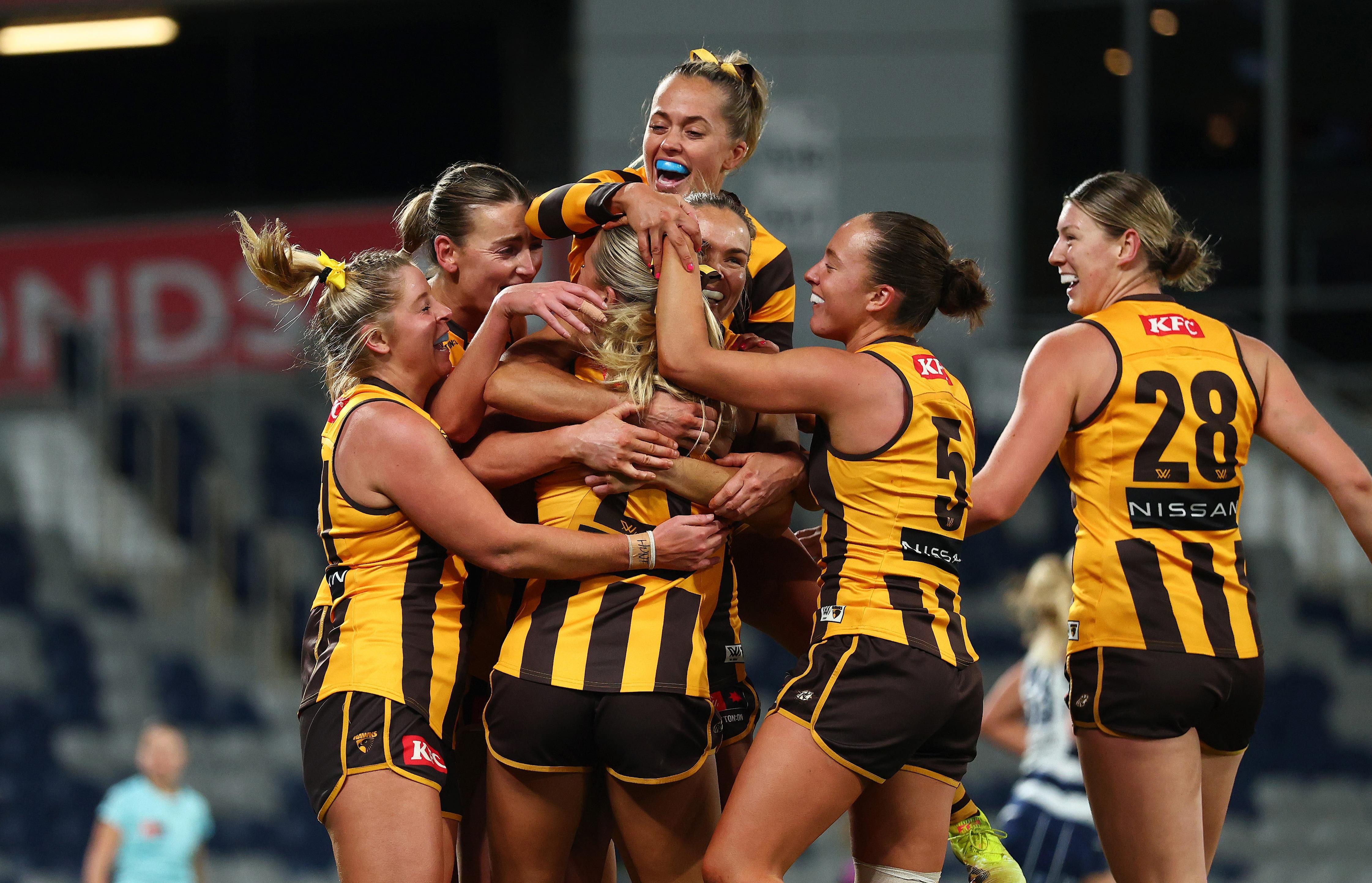 Hawks take lead in $1m McClelland Trophy race, Crows and Lions in the hunt