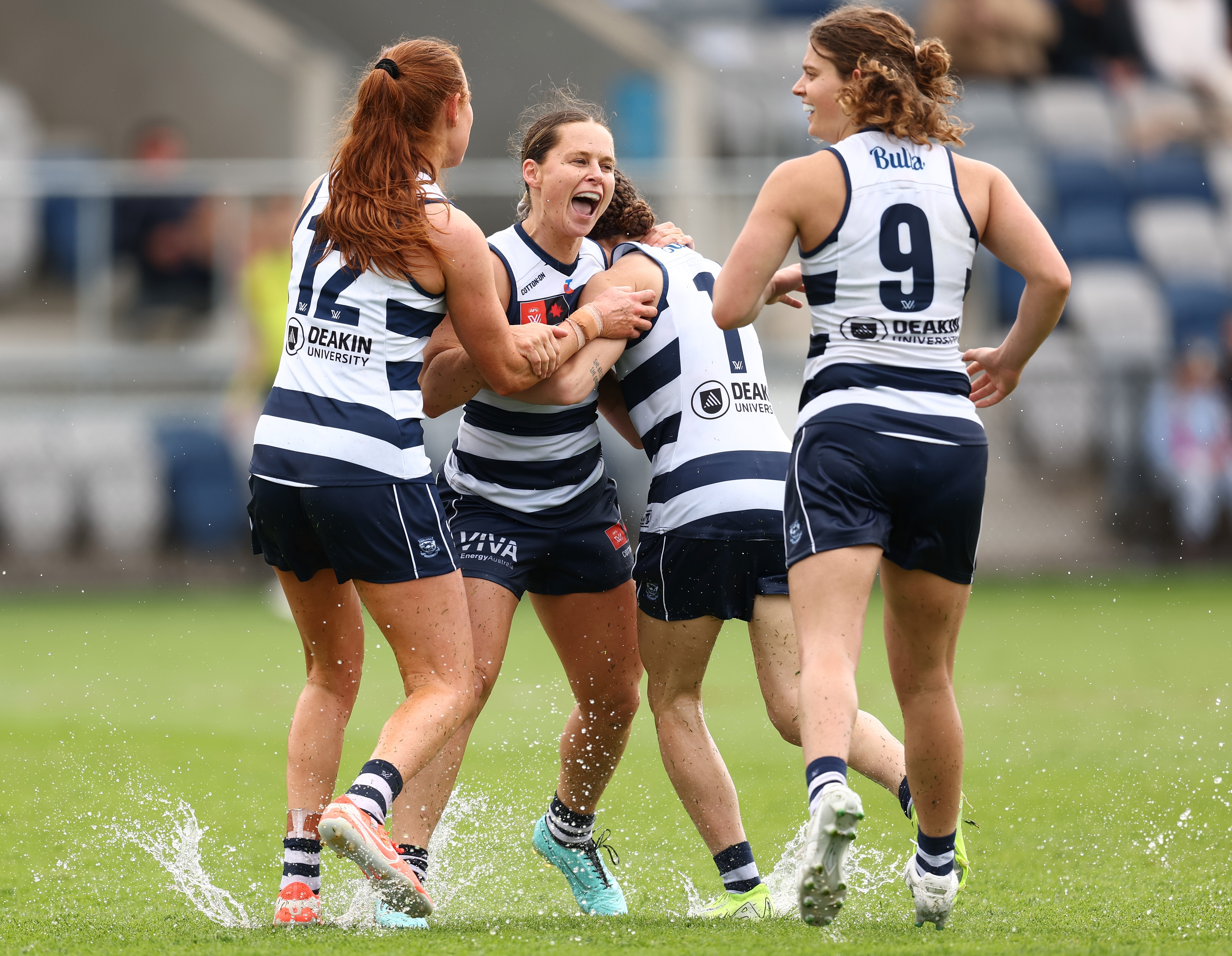 Cats end Dogs' finals chances in wet and wild scrap