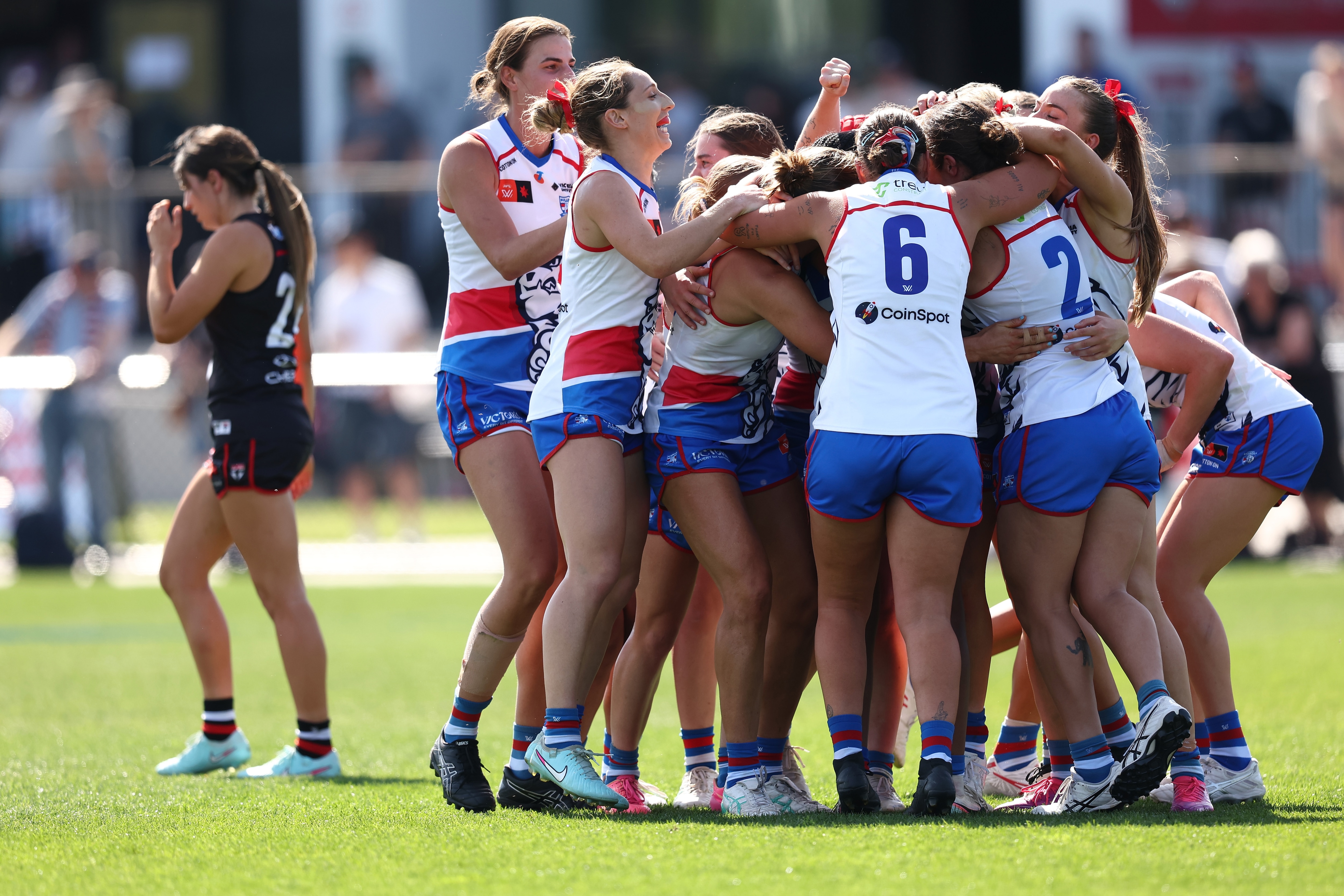 Dogs have their day in thumping of finals-bound Saints