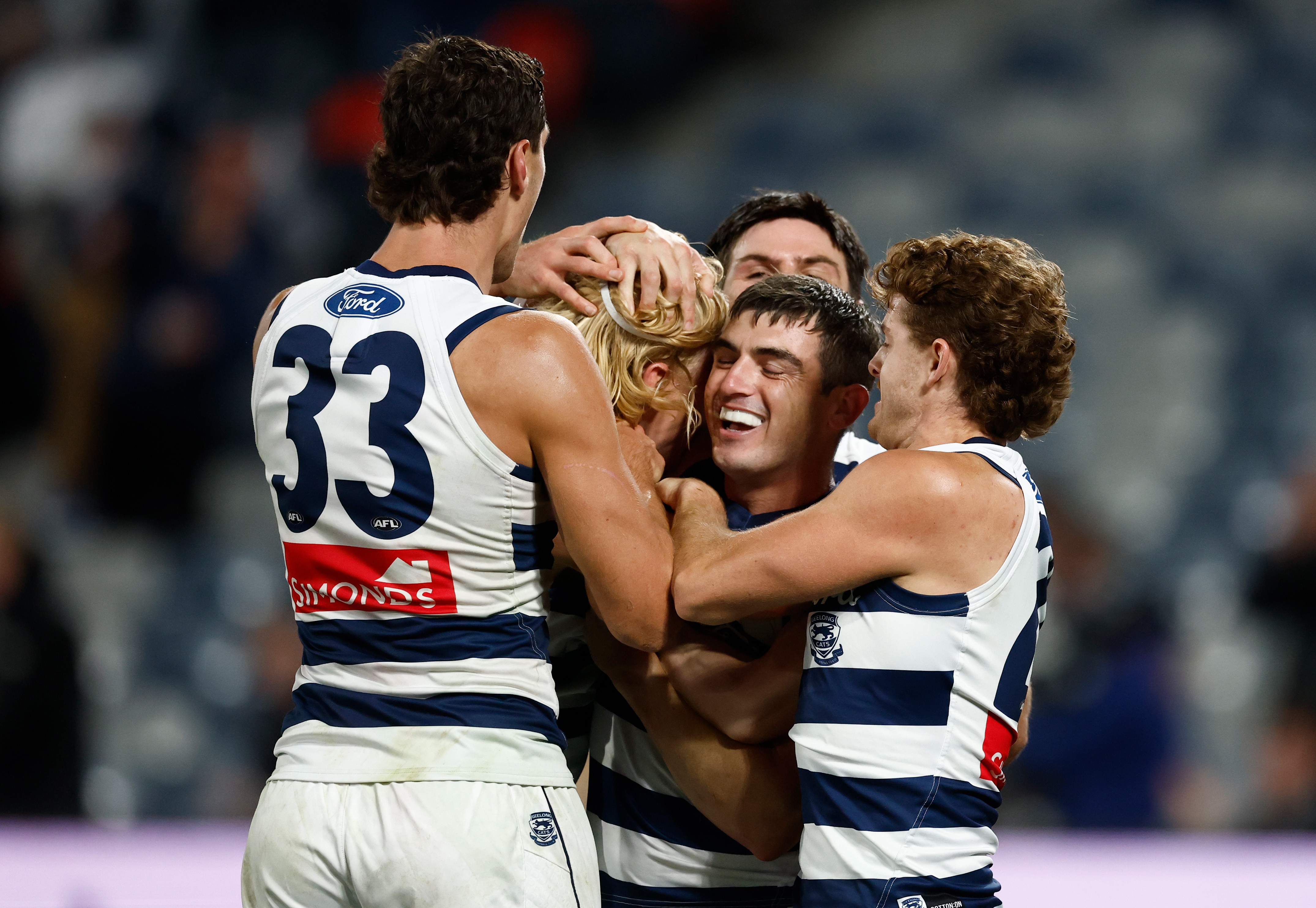 Cats extend 23-year streak over depleted Crows after tough slog