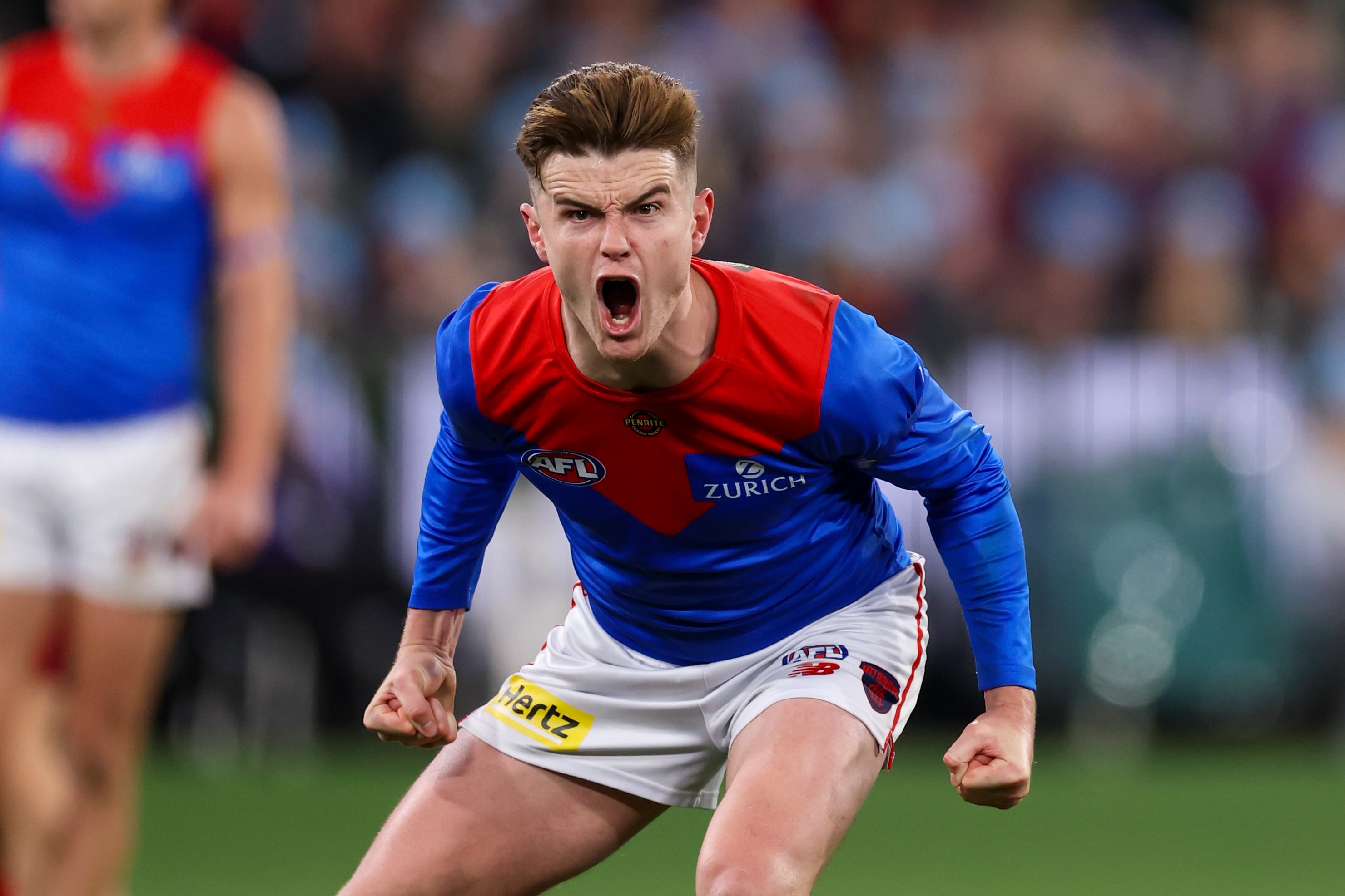 Demons down Pies in King's Birthday battle royale marred by serious injury