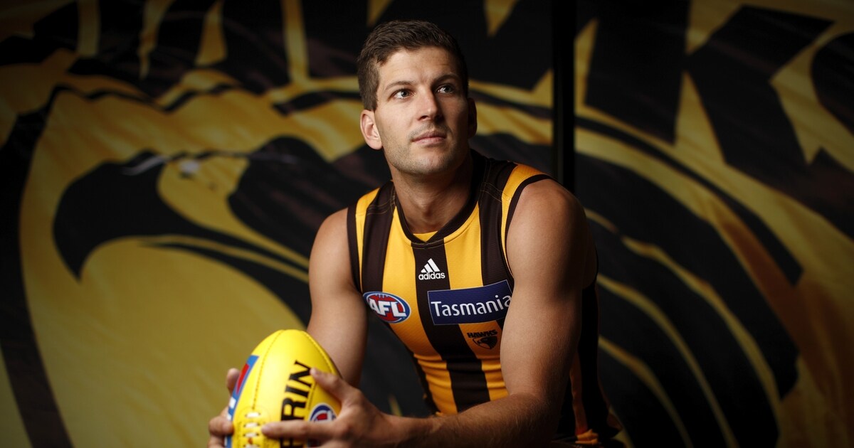 Triple flag winner Breust shuns free agency to stay a Hawk