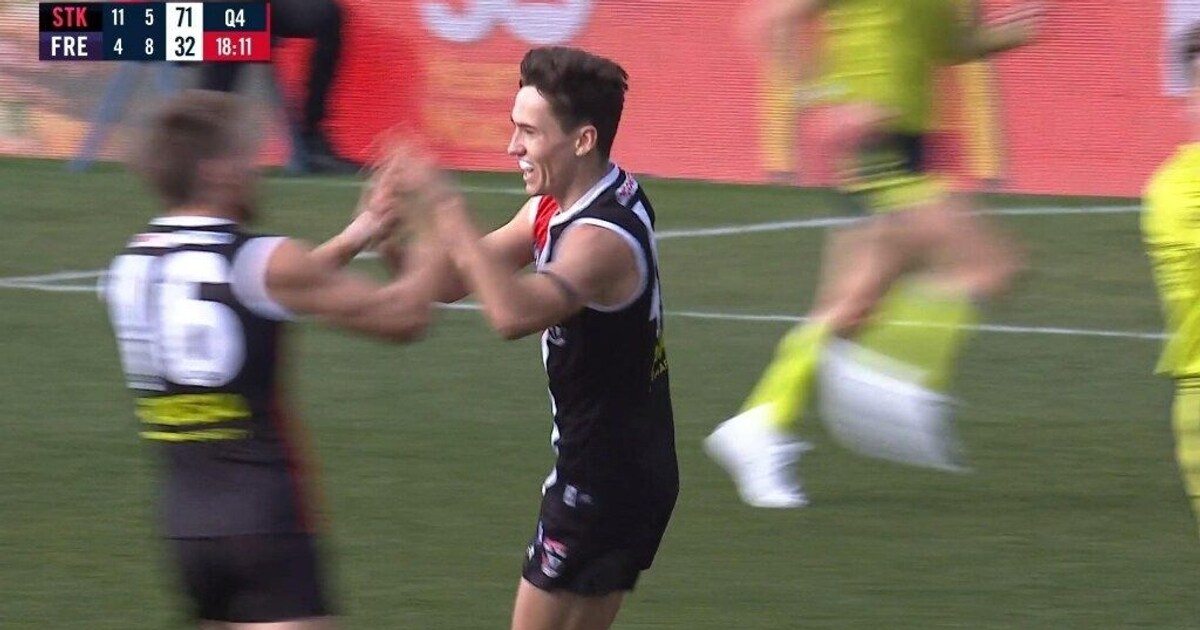 Sharman runs in and makes it four goals