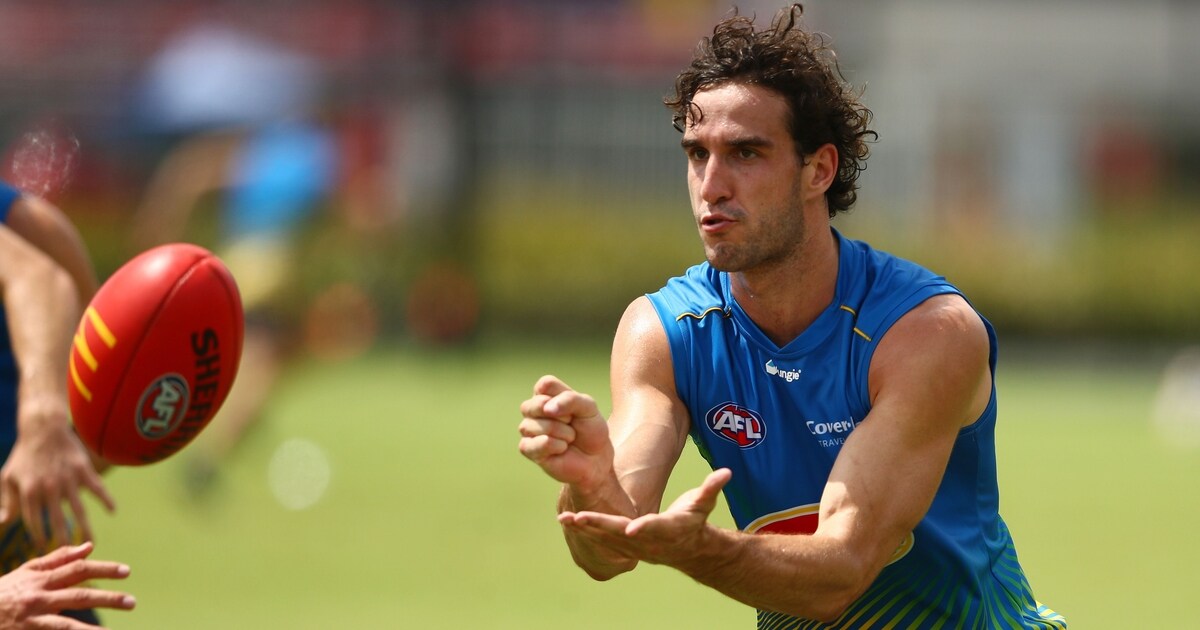 Gold Coast rising star Ben King sent for scans after injuring his knee ...