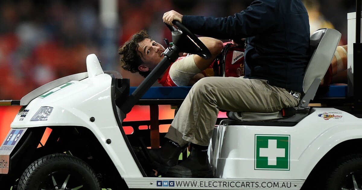 Powell stretchered off after sickening leg injury