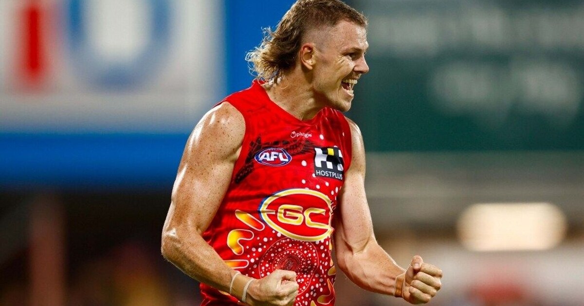 Holman swarmed after special moment in game 100