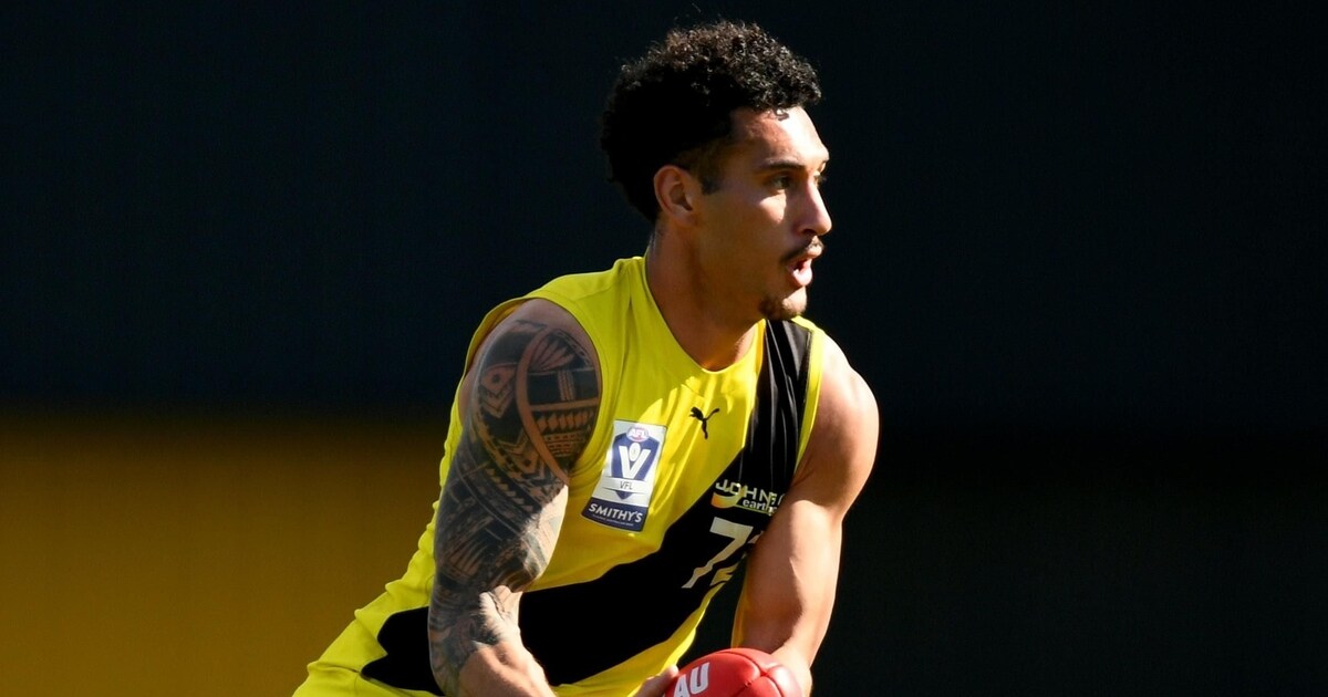 Richmond Tigers make a call between Mykelti Lefau and Mitch Schofield ...