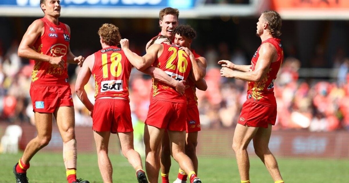 Young Sun surrounded after first AFL goal